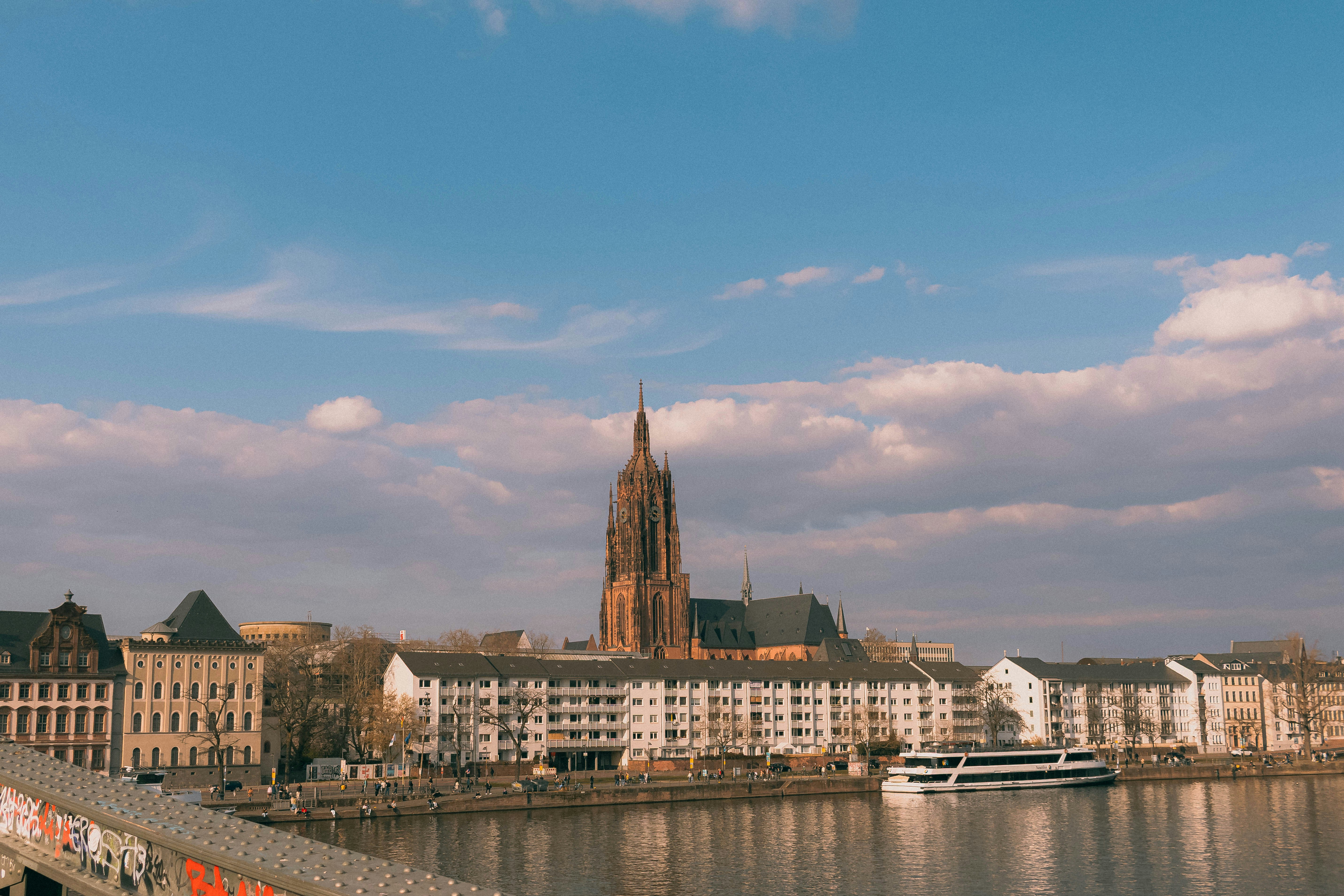 Toward the Cathedral: Riverside Cityscape Under Calm Skies