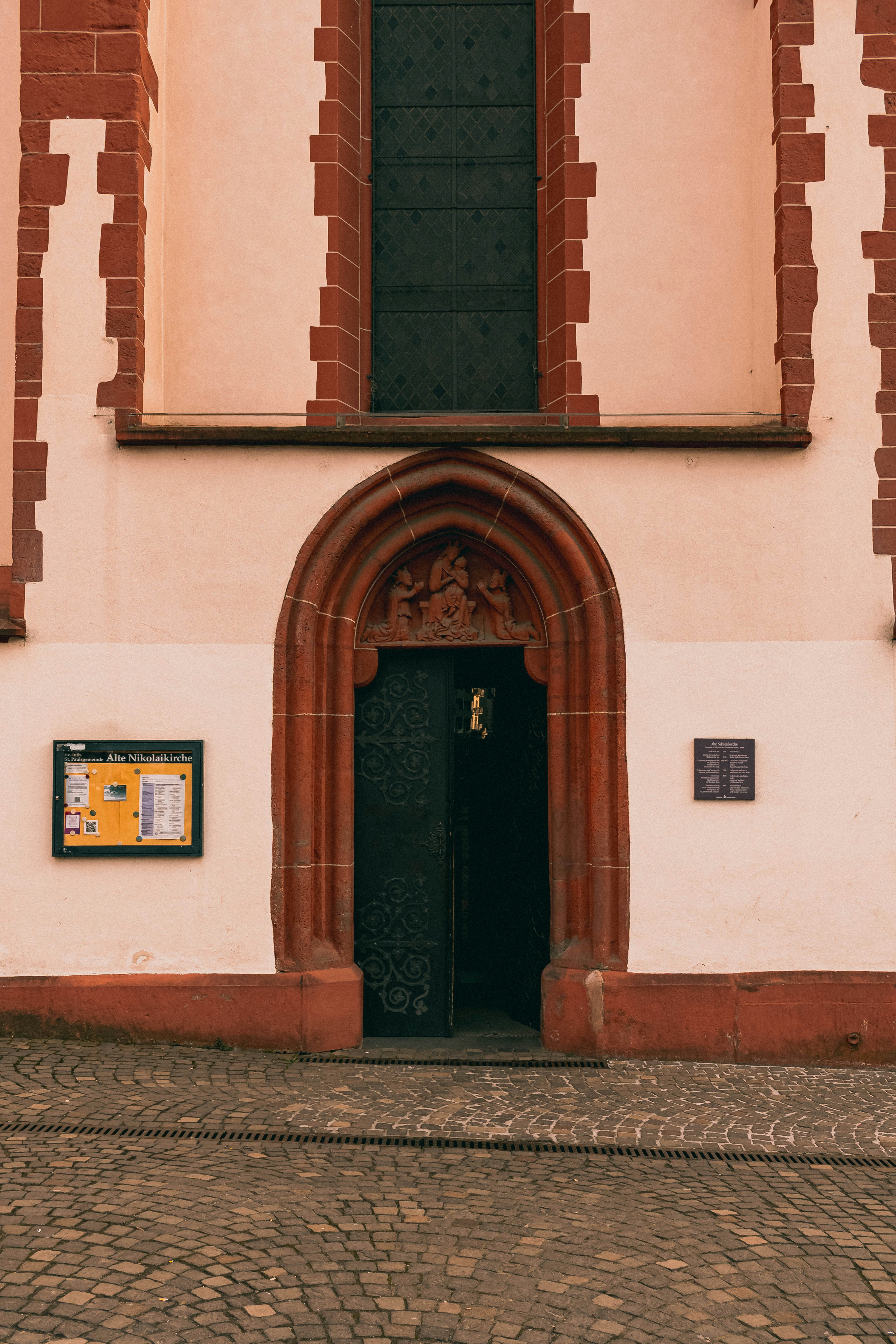 Arched Portal of the Peach-Colored Facade