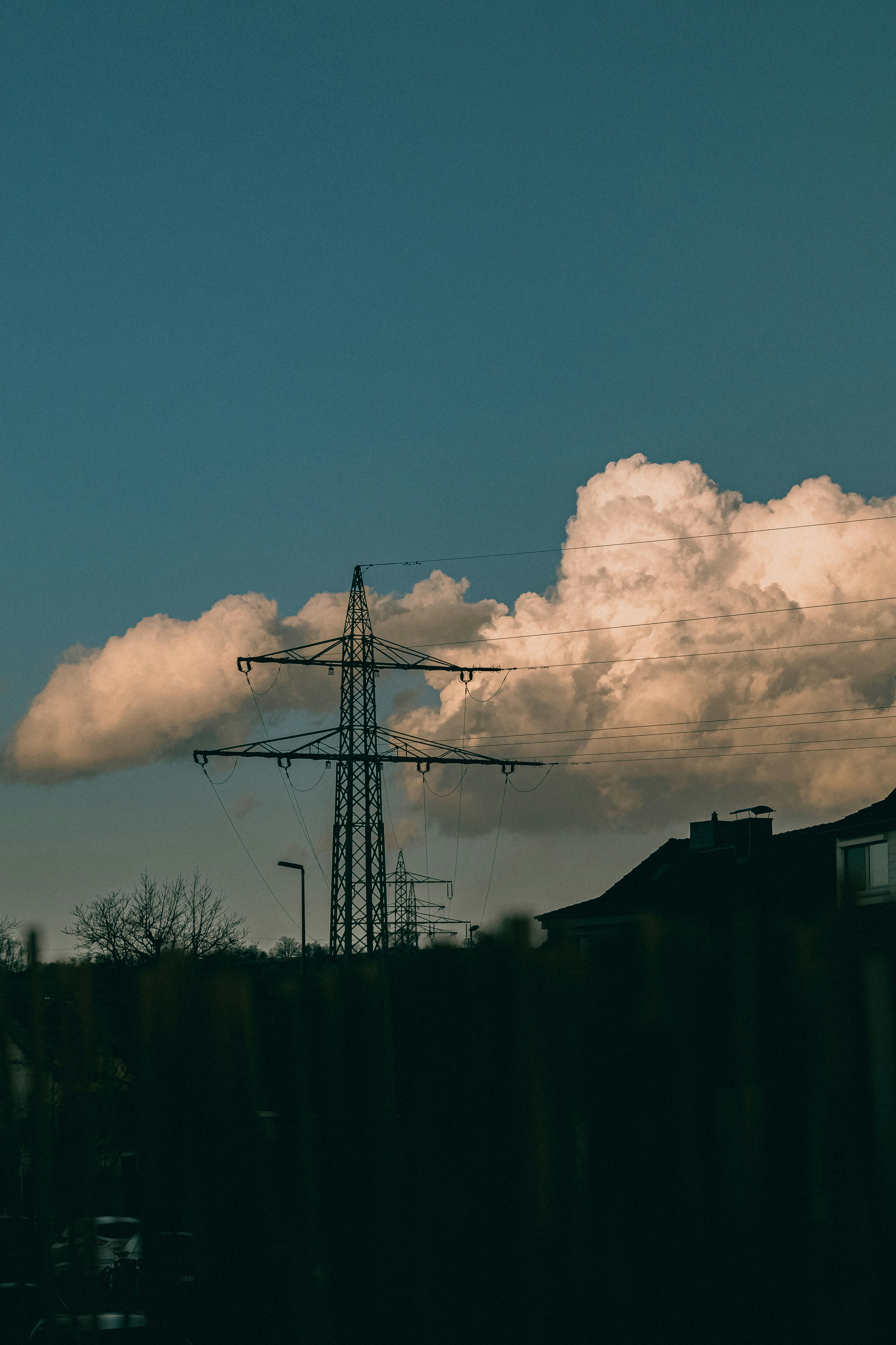 Power Lines against Sunset Clouds: A Quiet Horizon