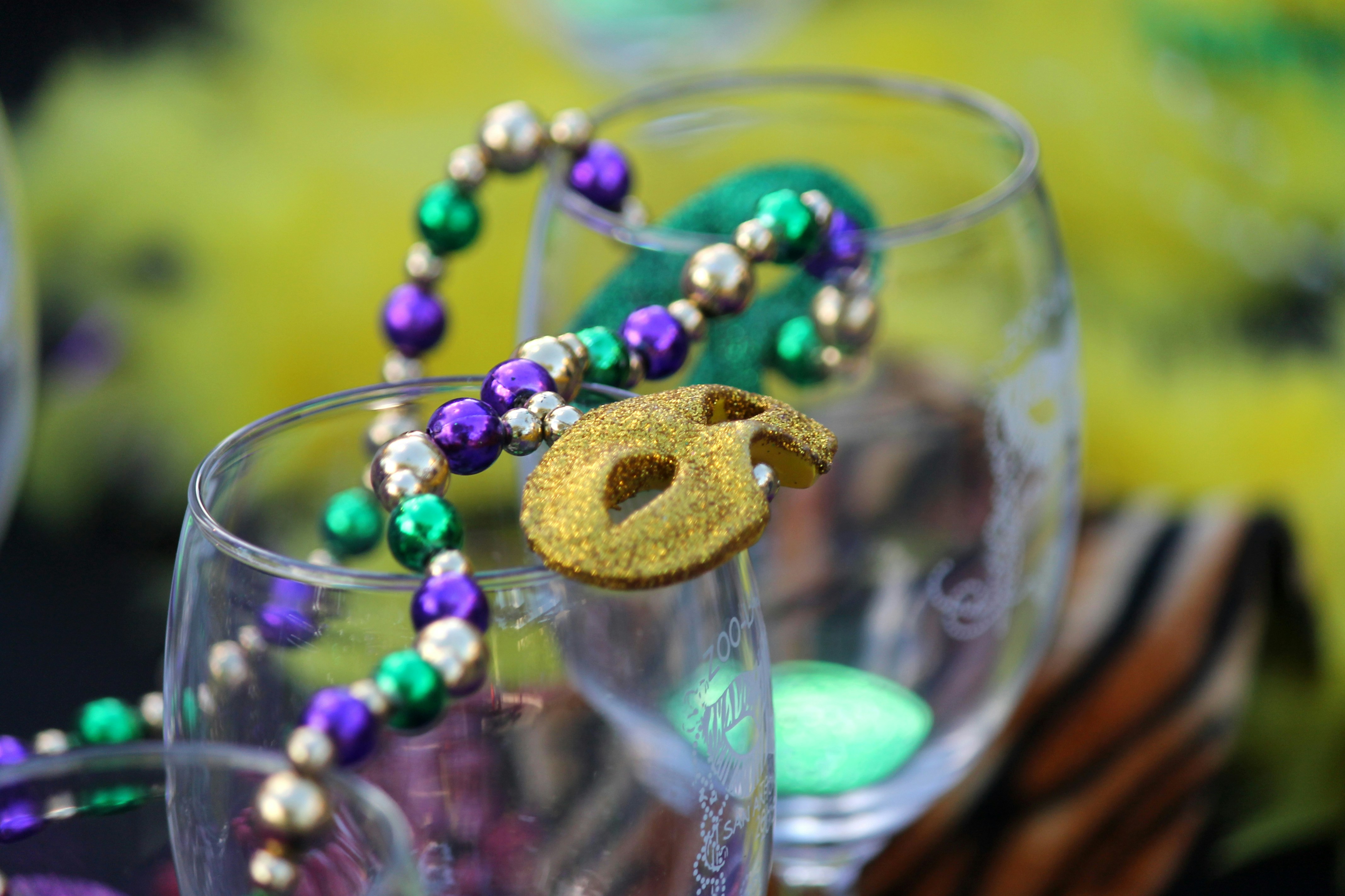 Golden Mask on Glasses: Beads Drape Over a Celebration