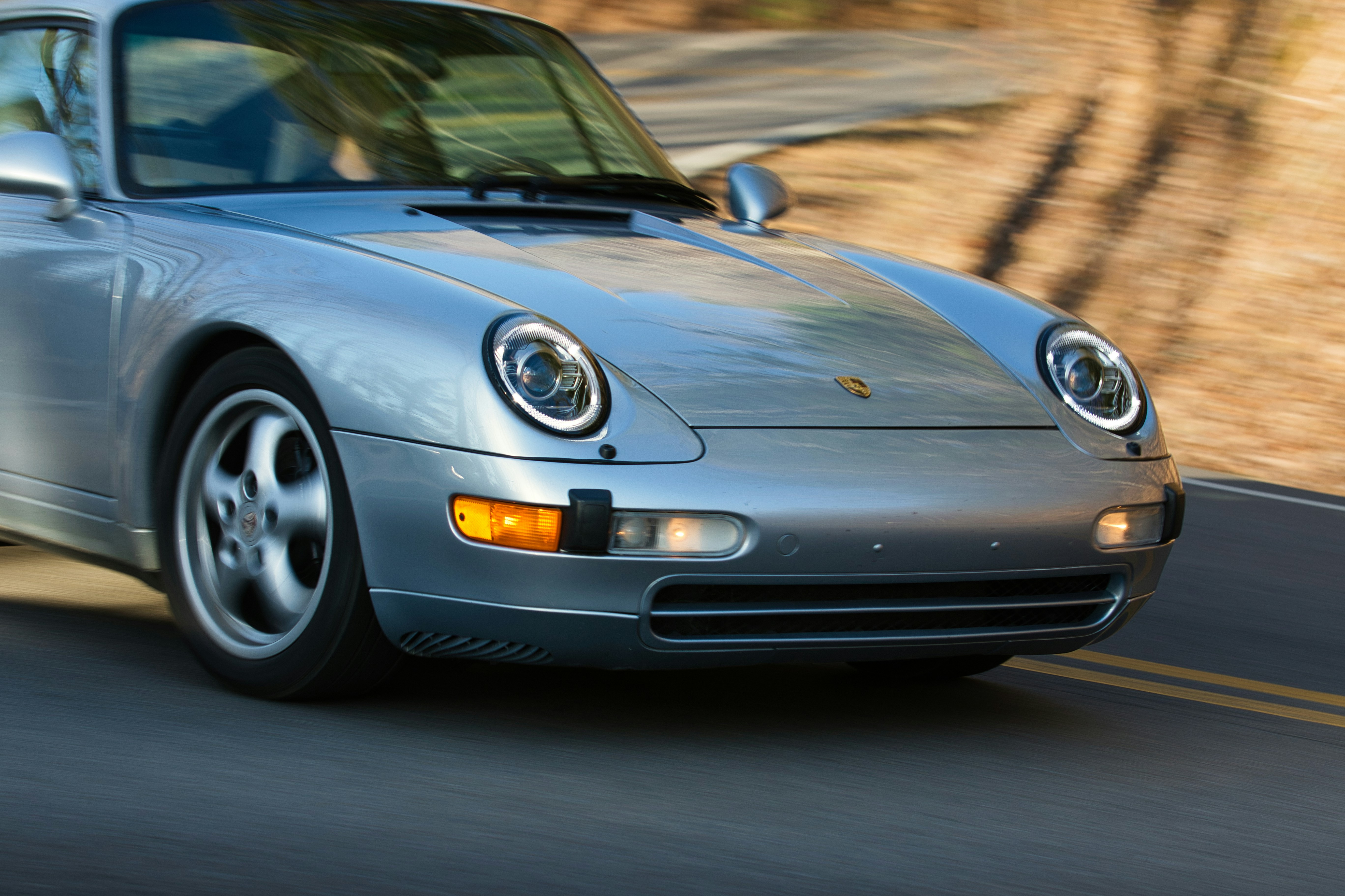 Blue Porsche in a Scenic Blur