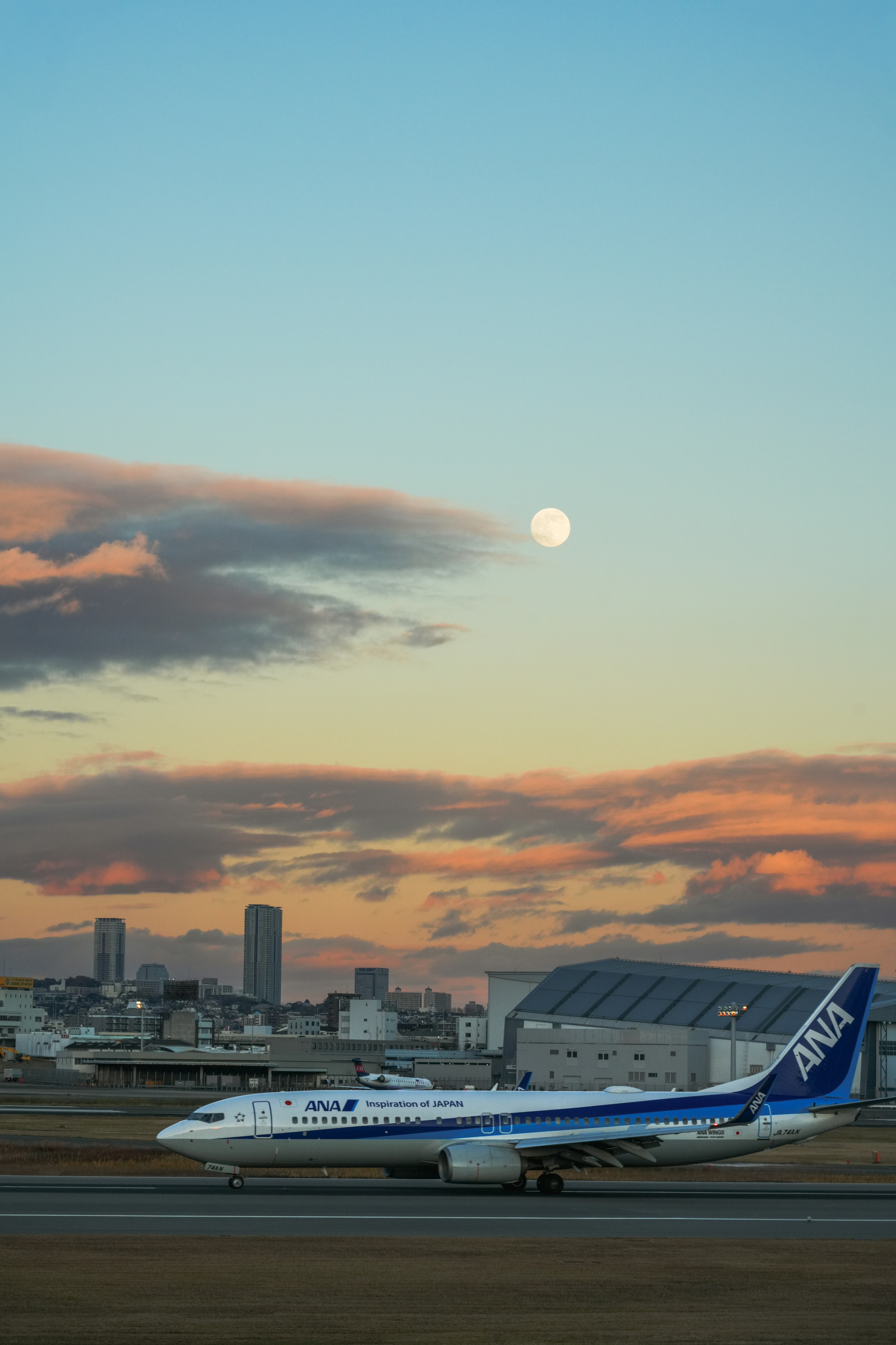 Moonlit Terminal: A Quiet Sunset Over the Taxiway