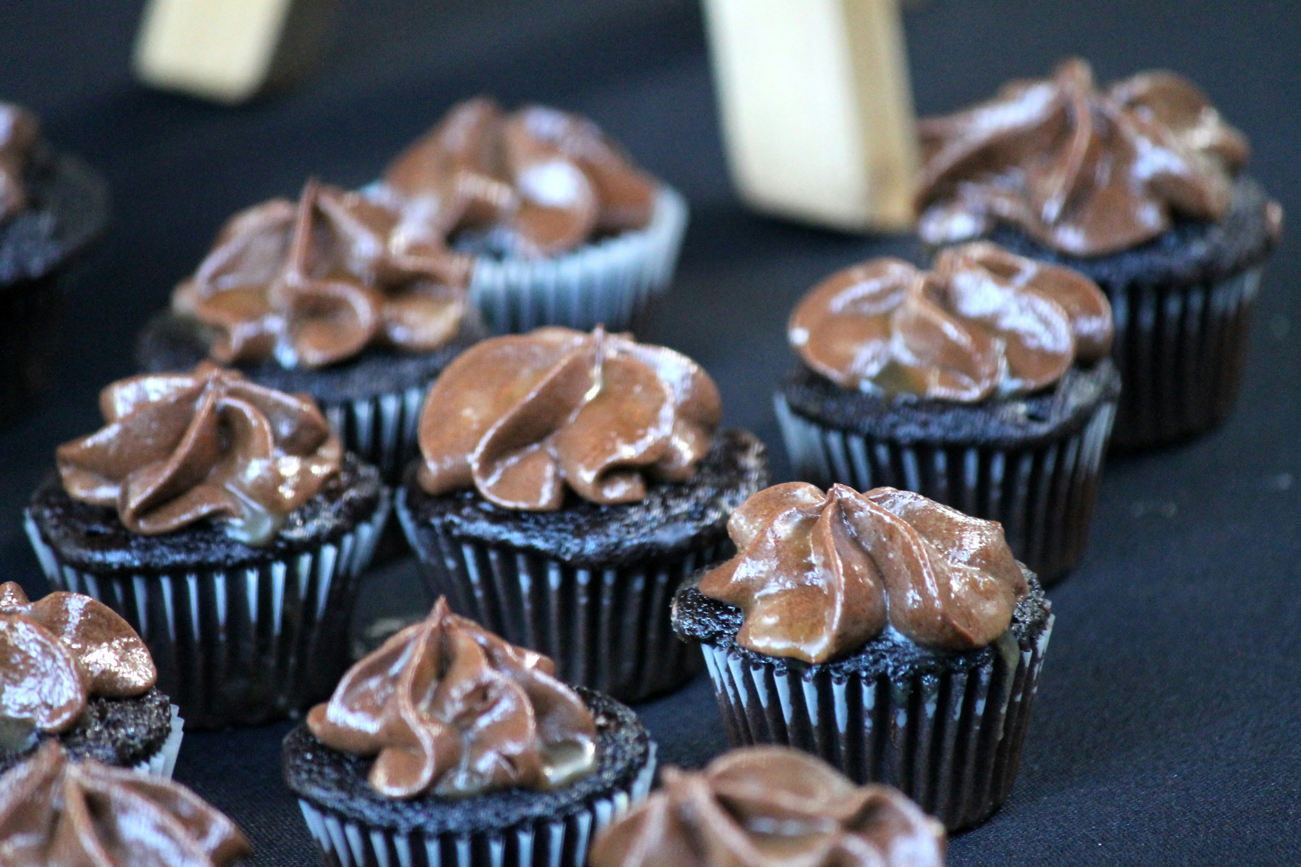 Chocolate Cupcake Mosaic: Swirl Peaks on a Dark Silk Bed