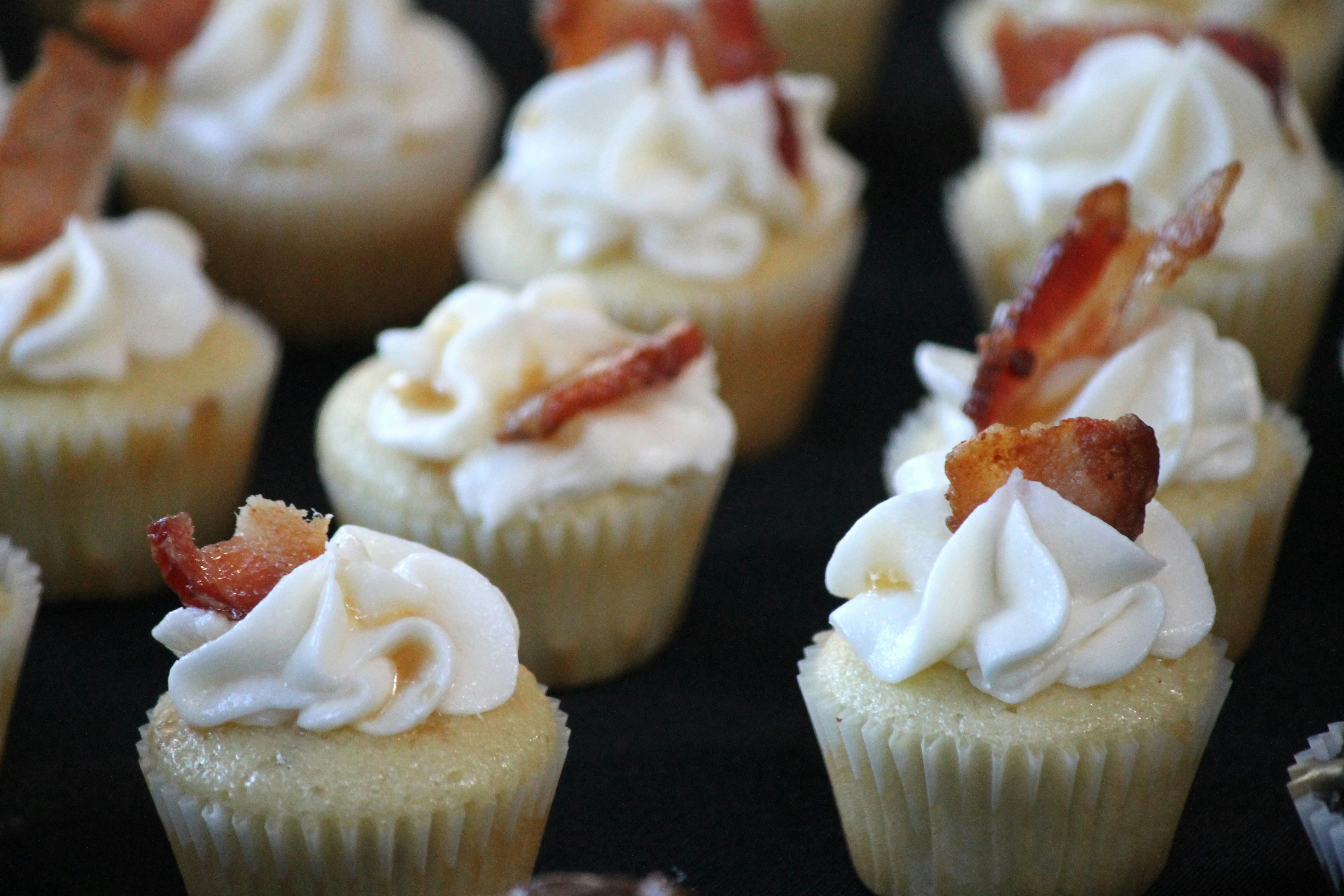 Cream Crowned Cheesecakes: A Tray of Bacon-Tinted Toppers
