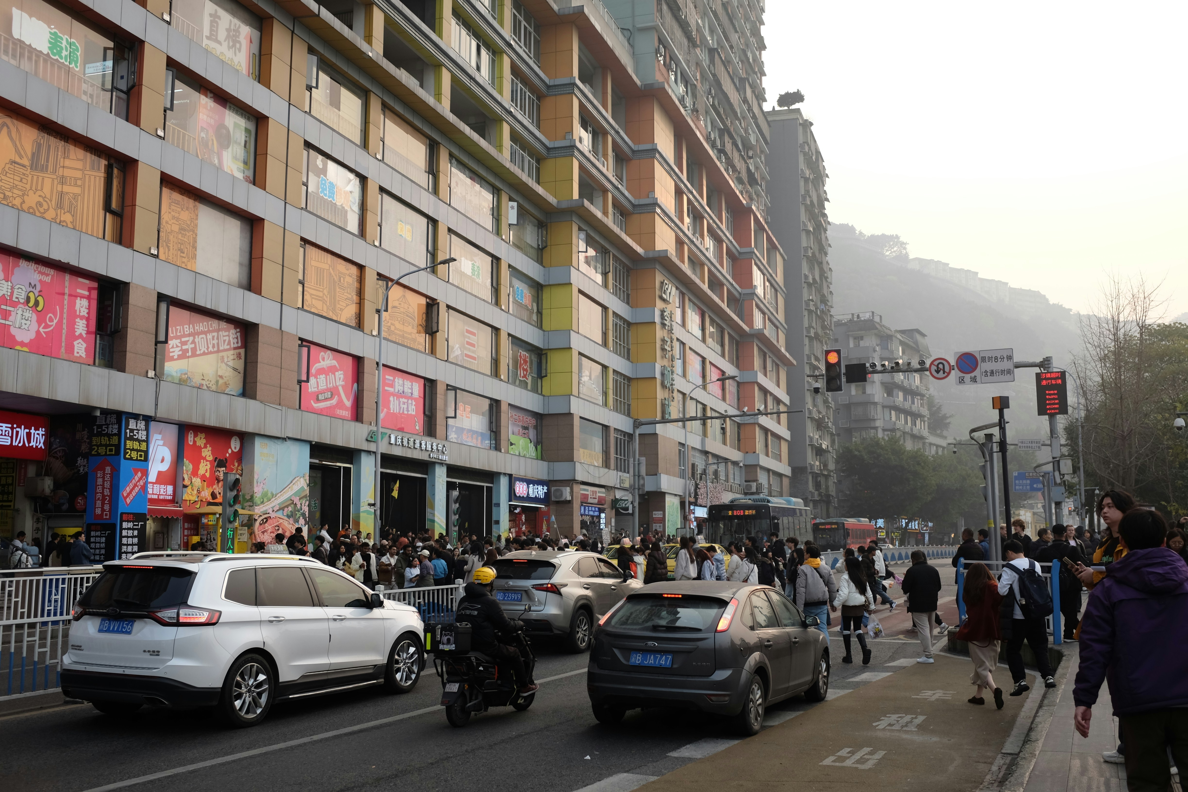 Citylife Confluence: A Busy Street Emerges Between Painted Facades