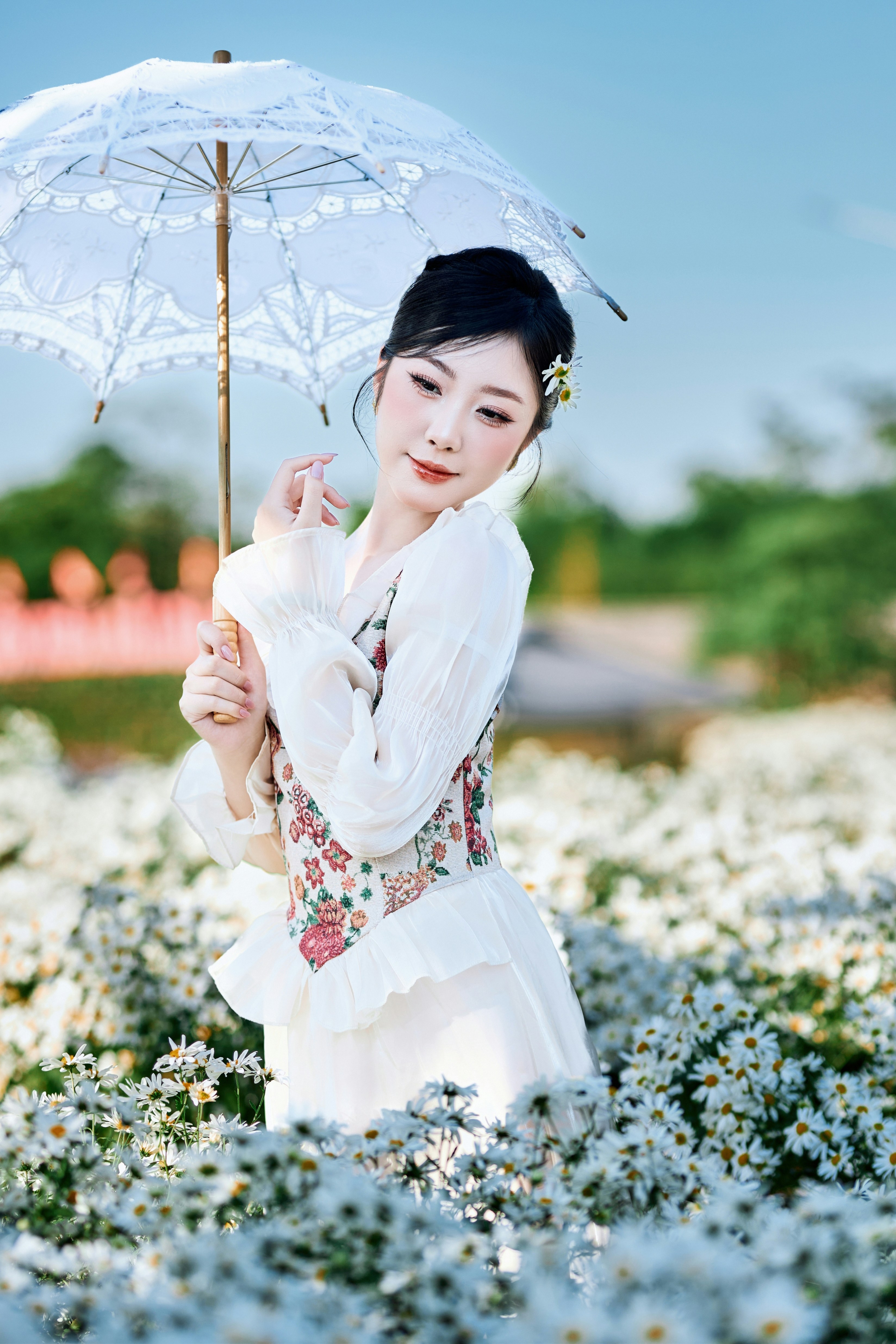 Grace in White: A Portrait Among Daisies