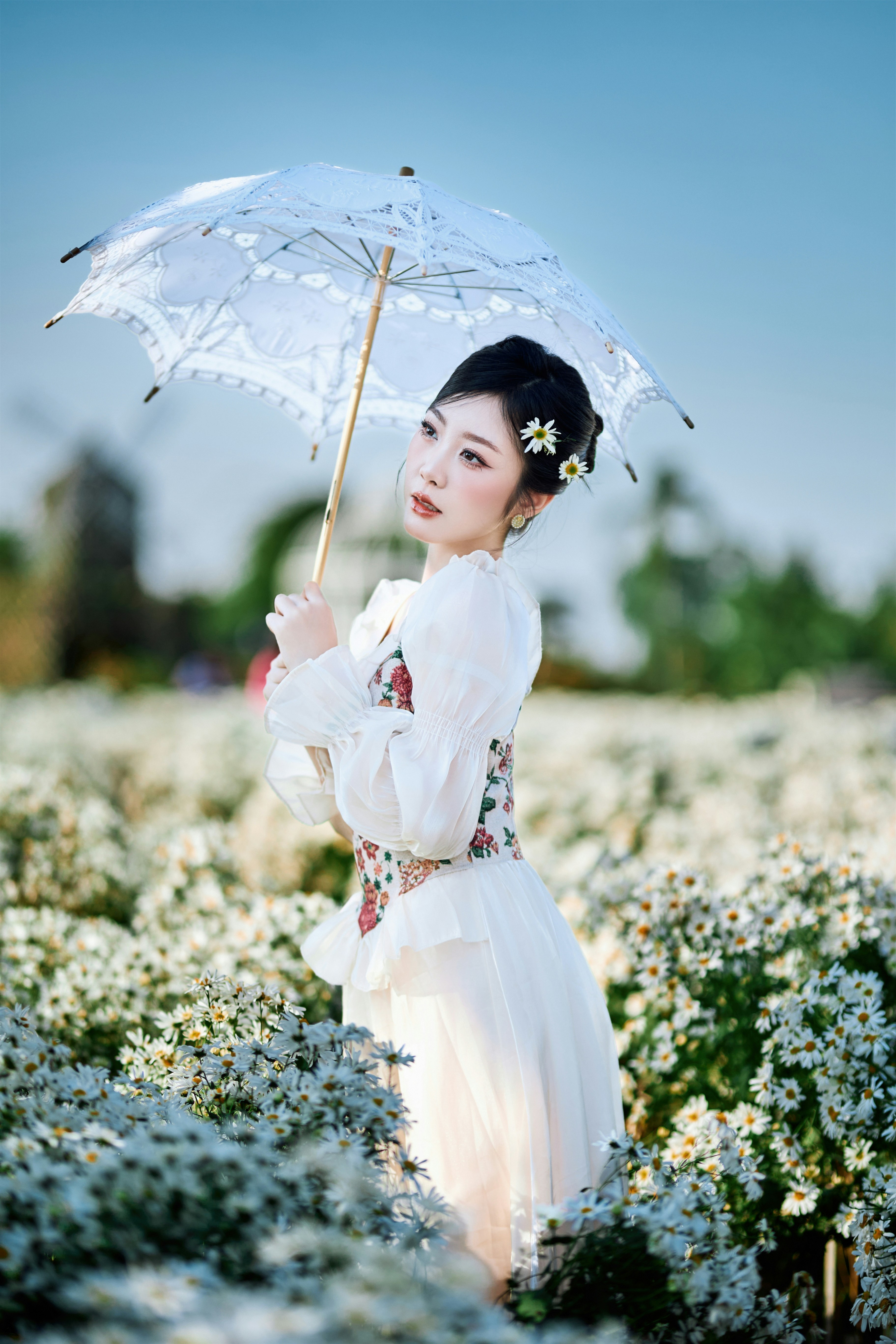 Daisy-draped Elegance under a Lace Umbrella