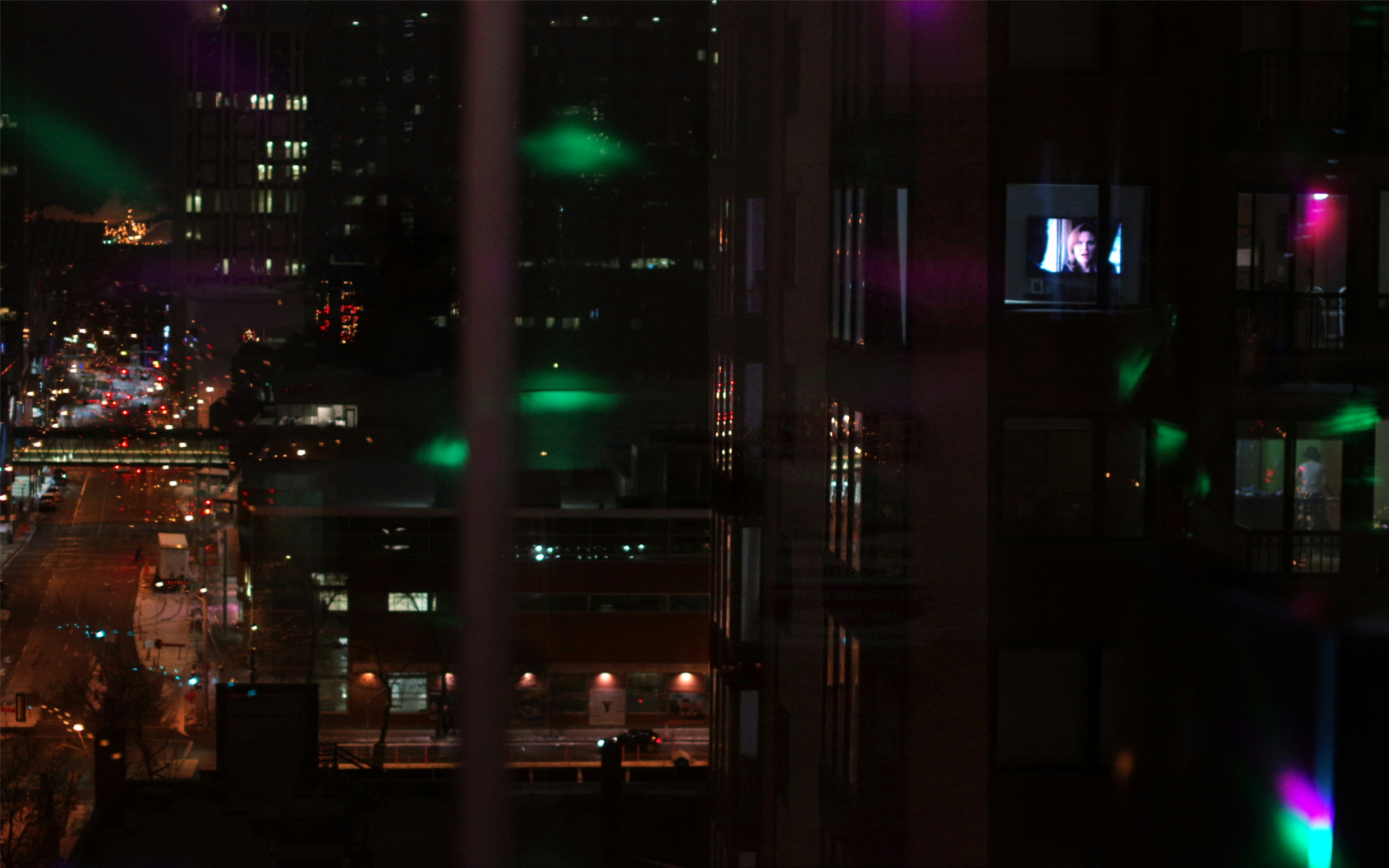 Neon Horizon Through a City Window