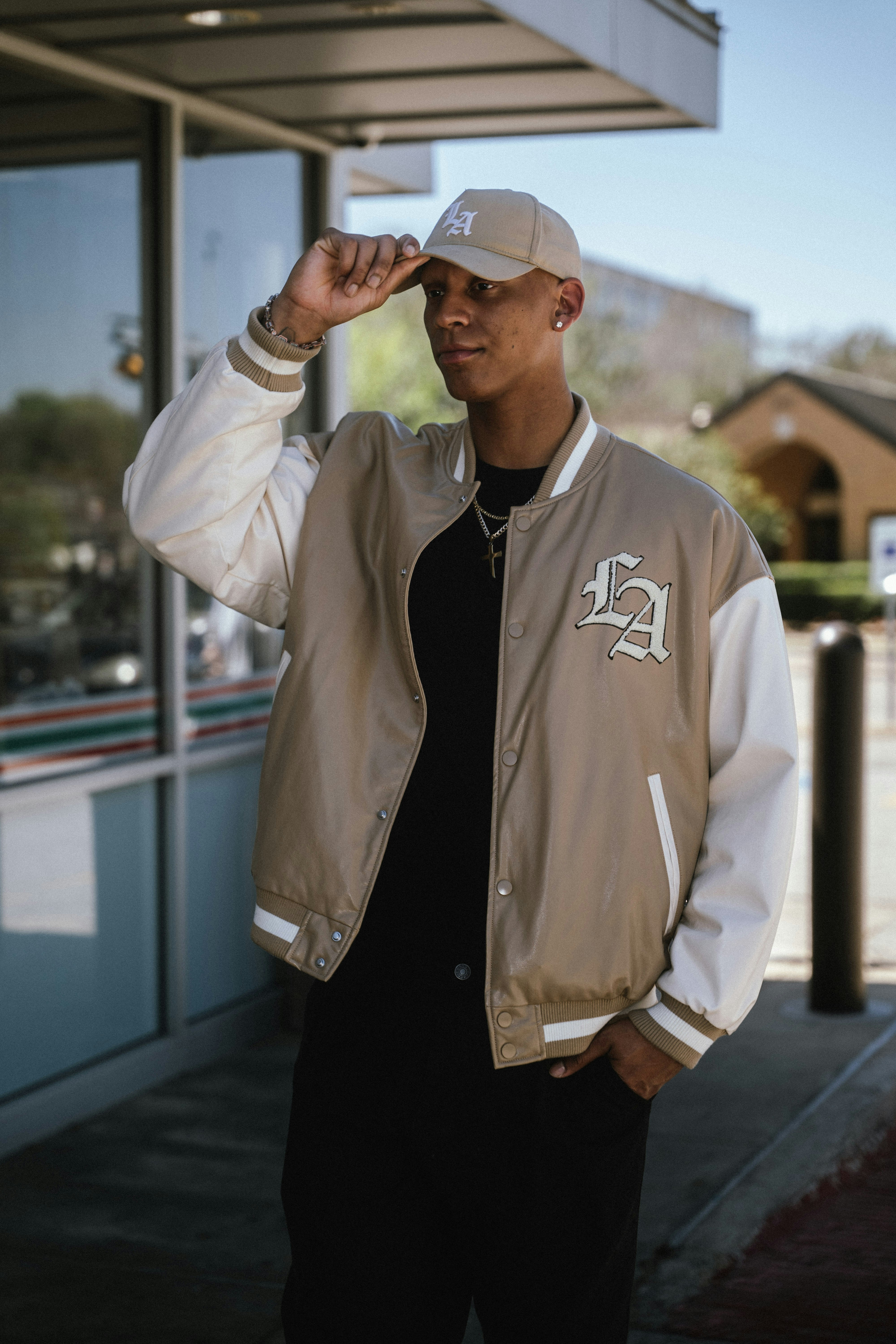 Cap and Coat: Street Style at Dusk in a Suburban Corner