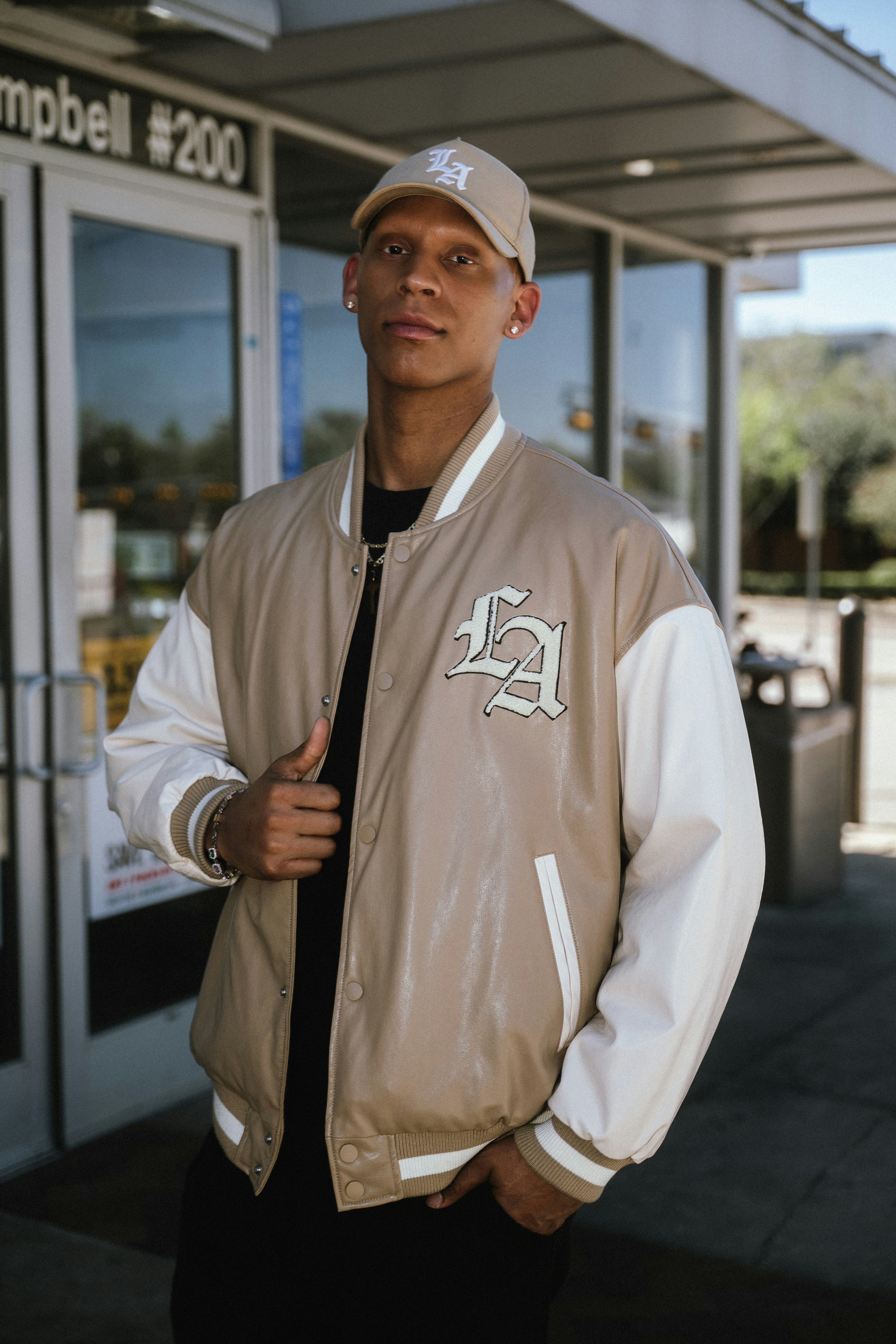 Midtown Confidence: ALA Cap and Varsity Jacket in Neonlight Street