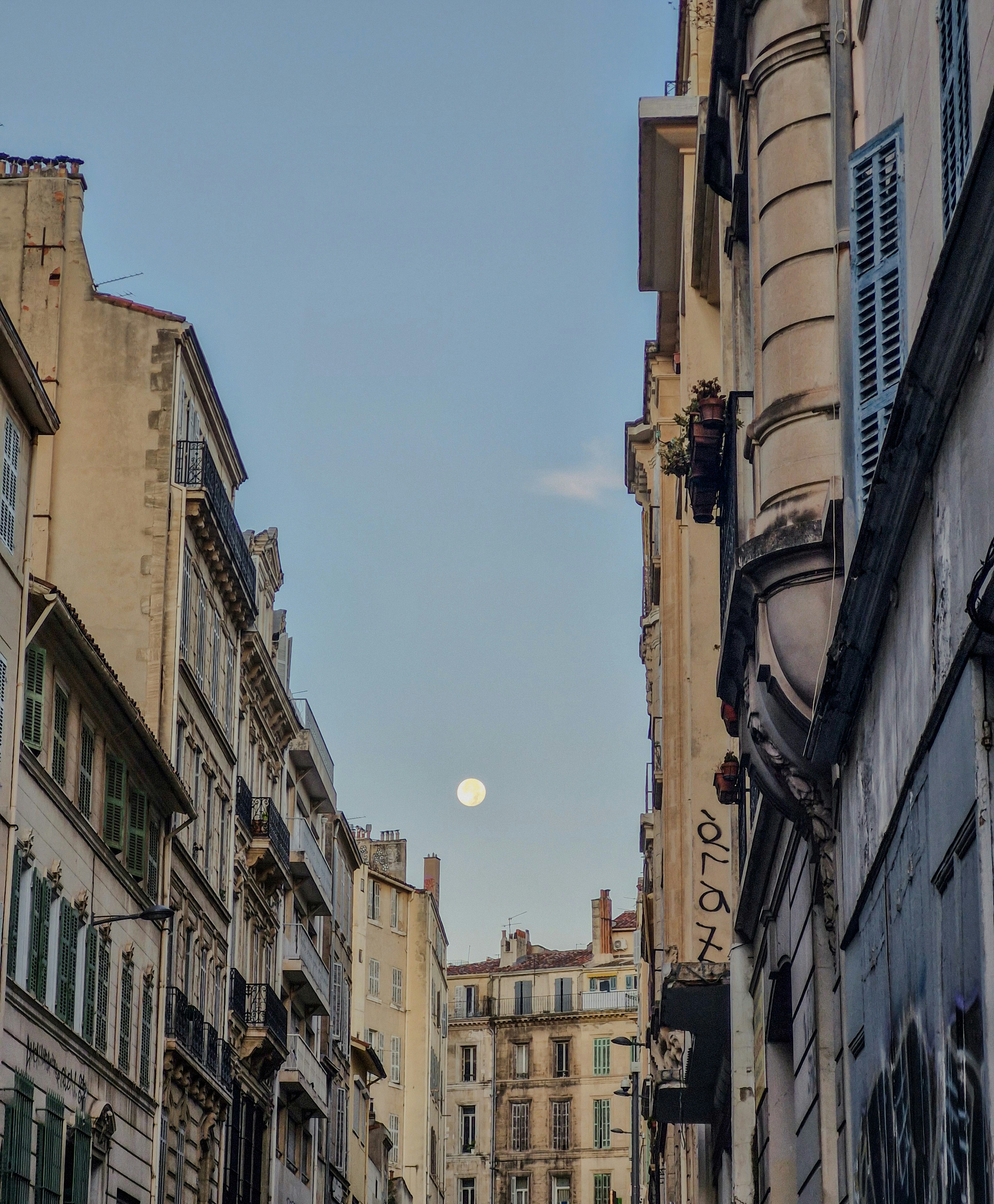 Moonlight Above the Narrow European Street