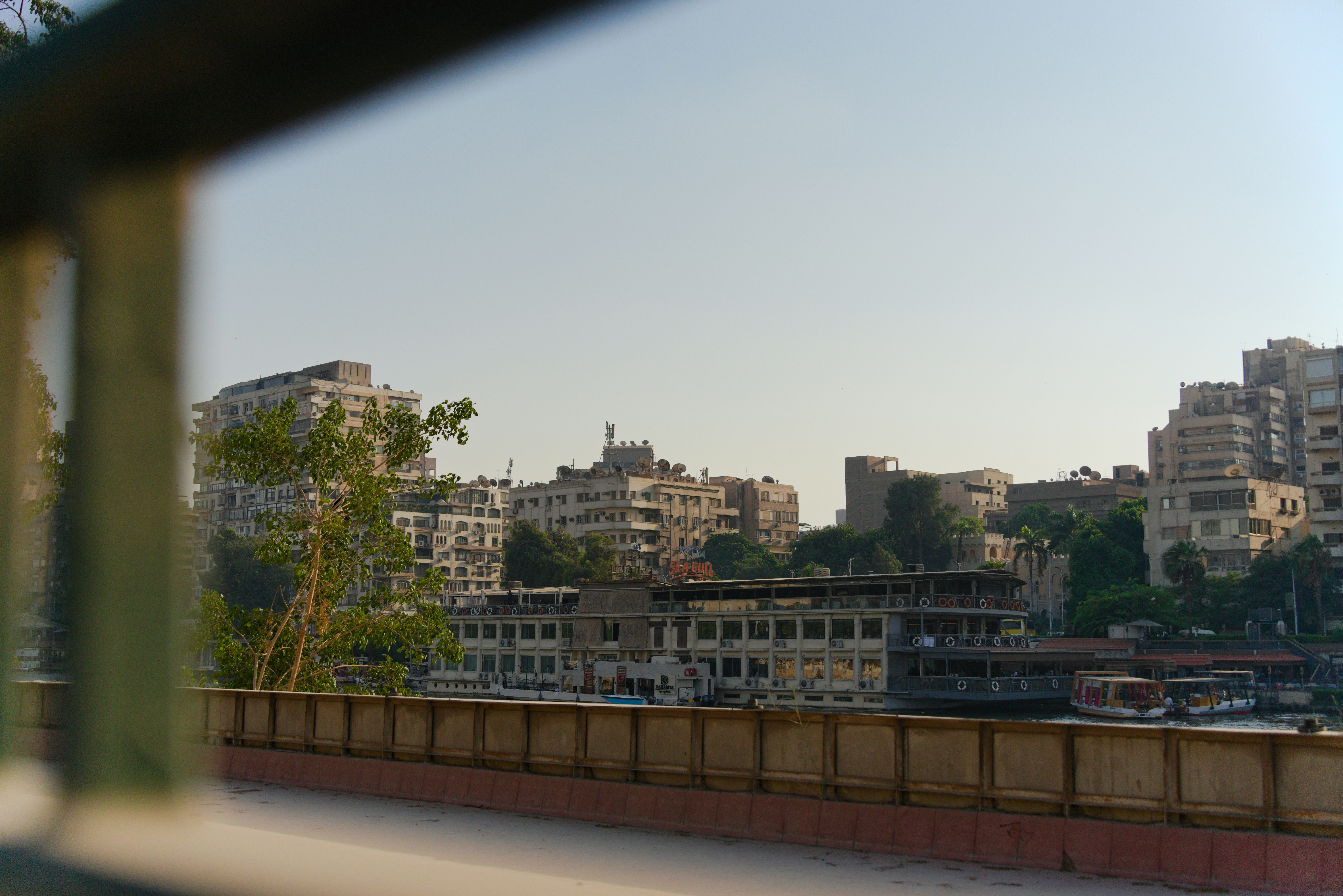 Riverside Cityscape: Echoes of a Quiet Morning