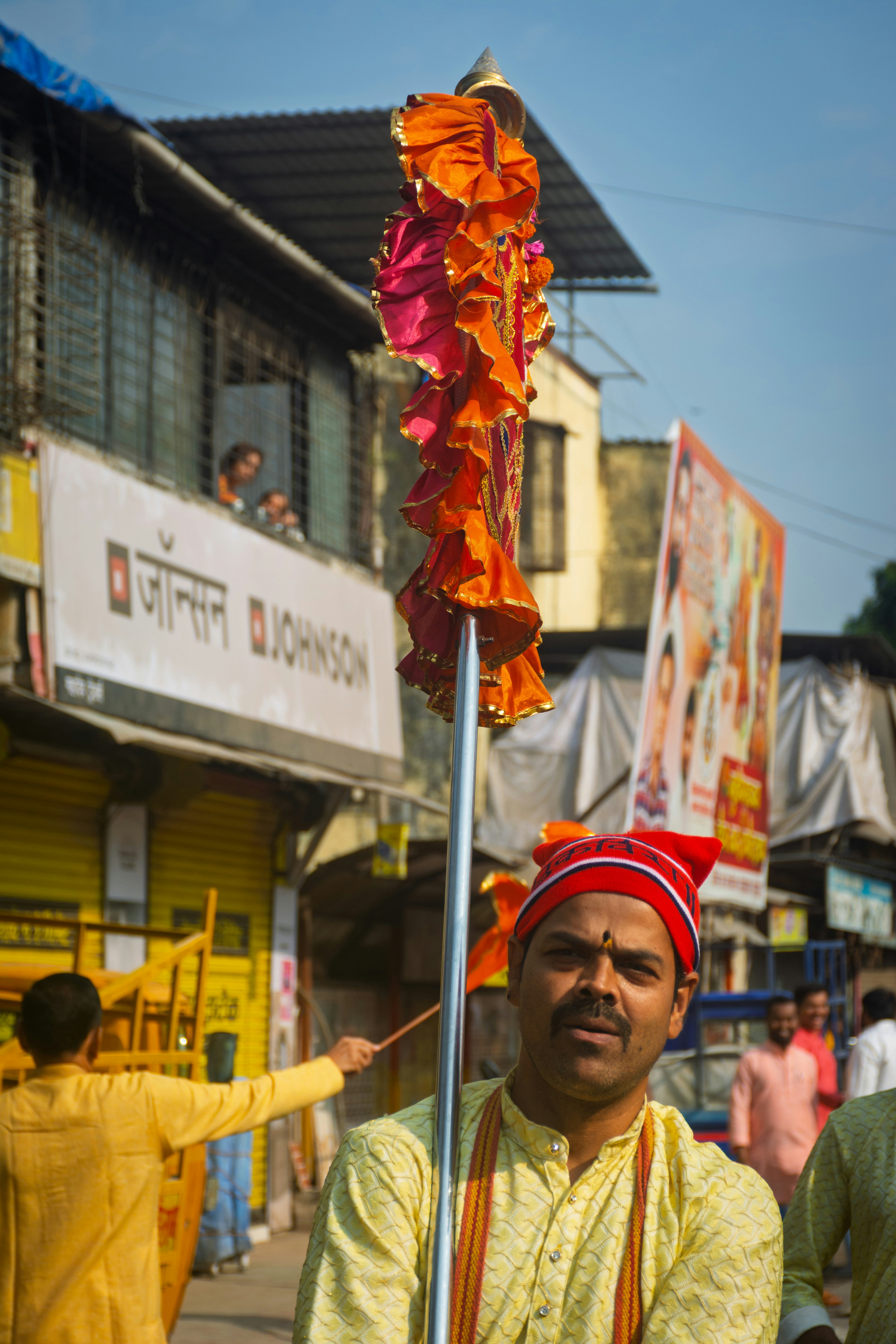 Saffron-tipped Pole Bearer in the Urban Pulse