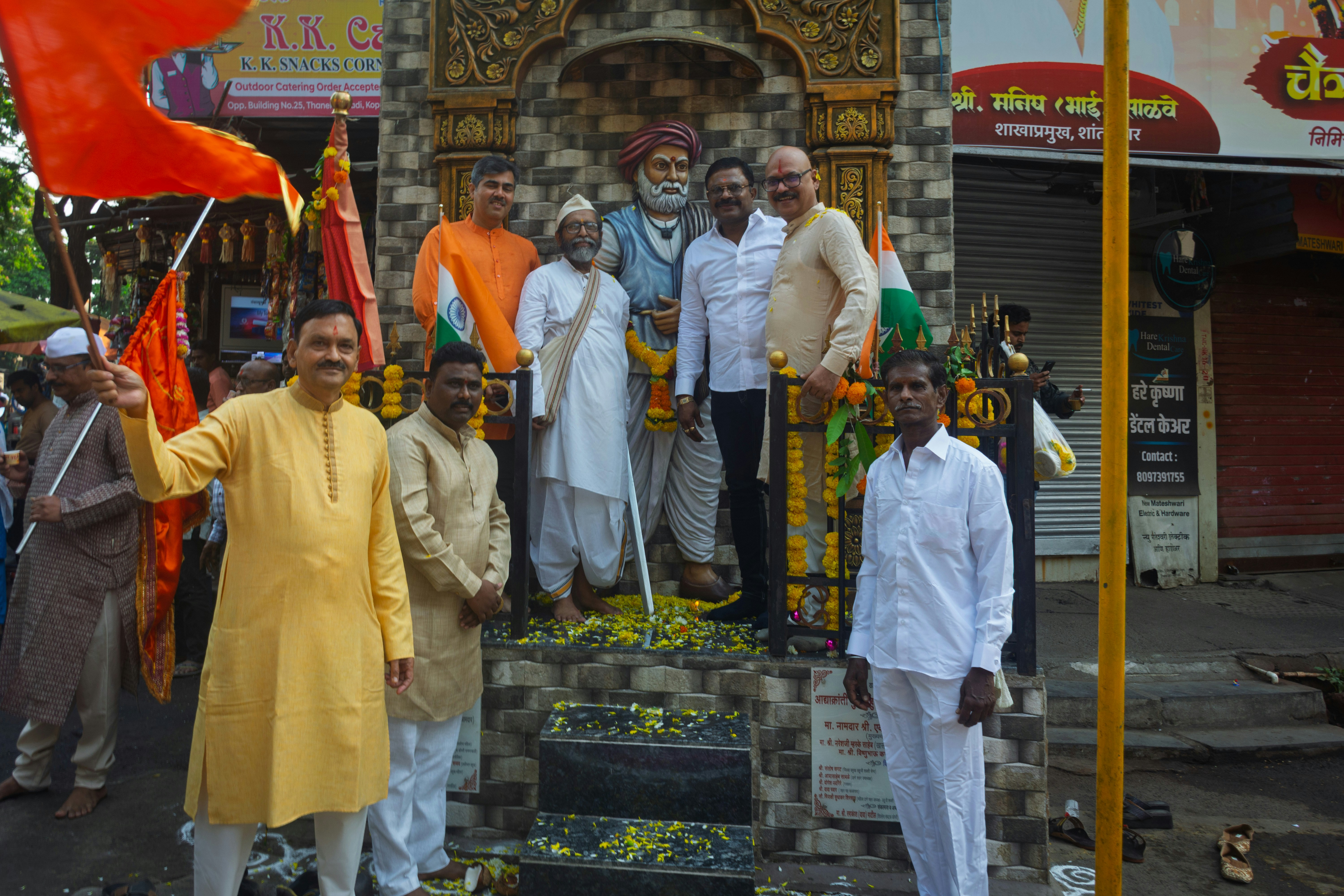 Temple Steps Ceremony: A Group Portrait in Front of an Elaborate Shrine