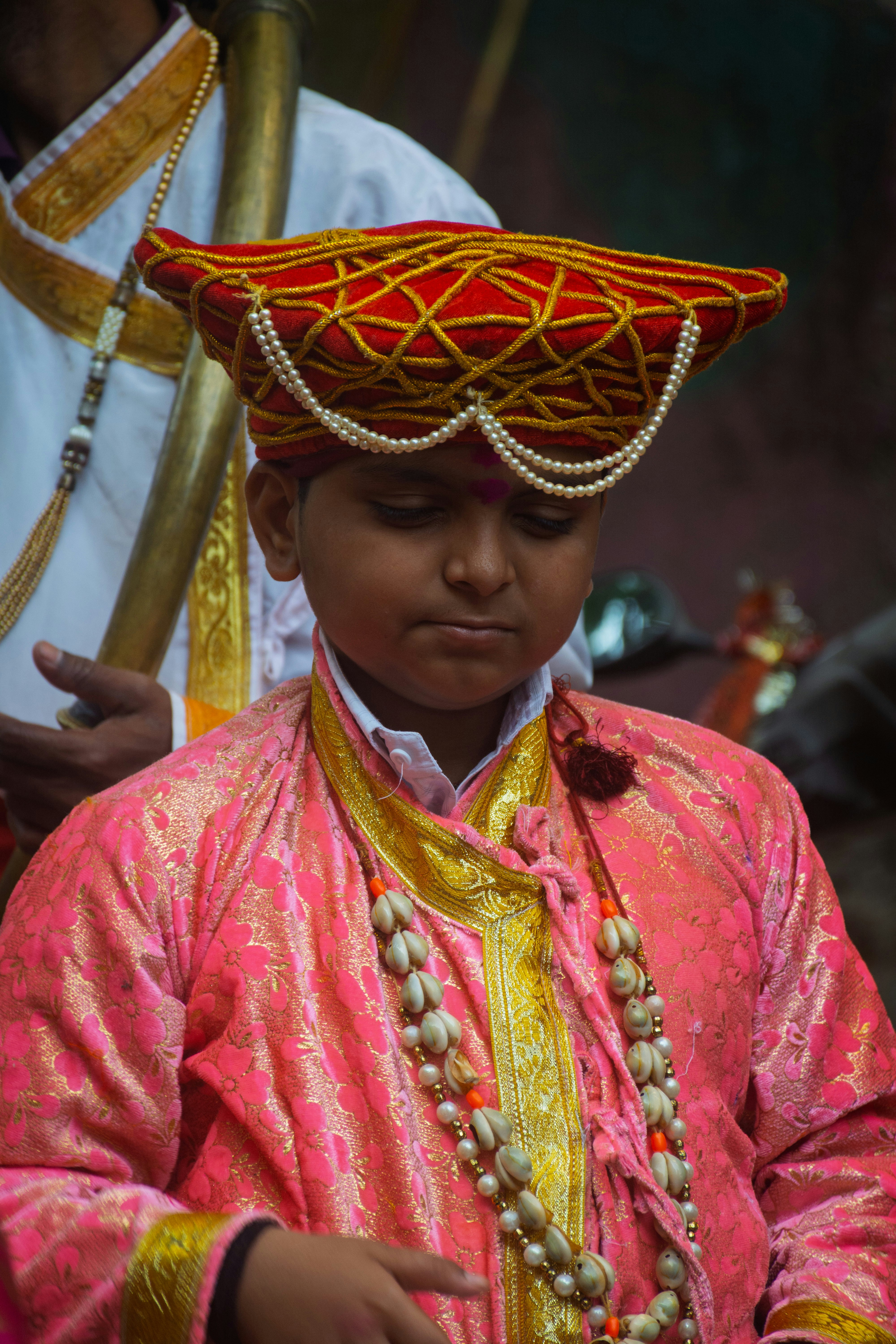 Regal Child in Pink Ceremonial Attire