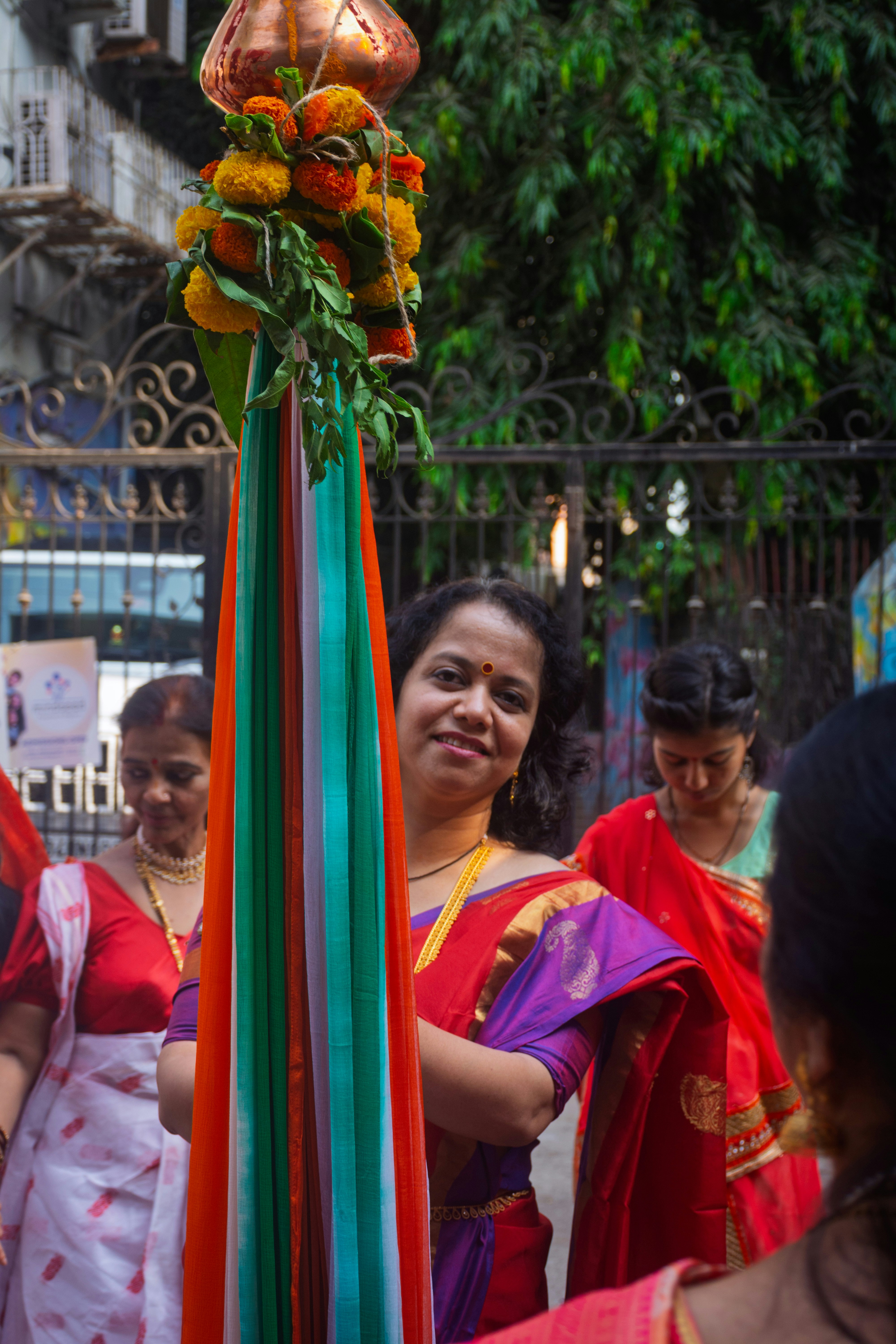 Colorful Garland Ceremony Amid Street Vendors