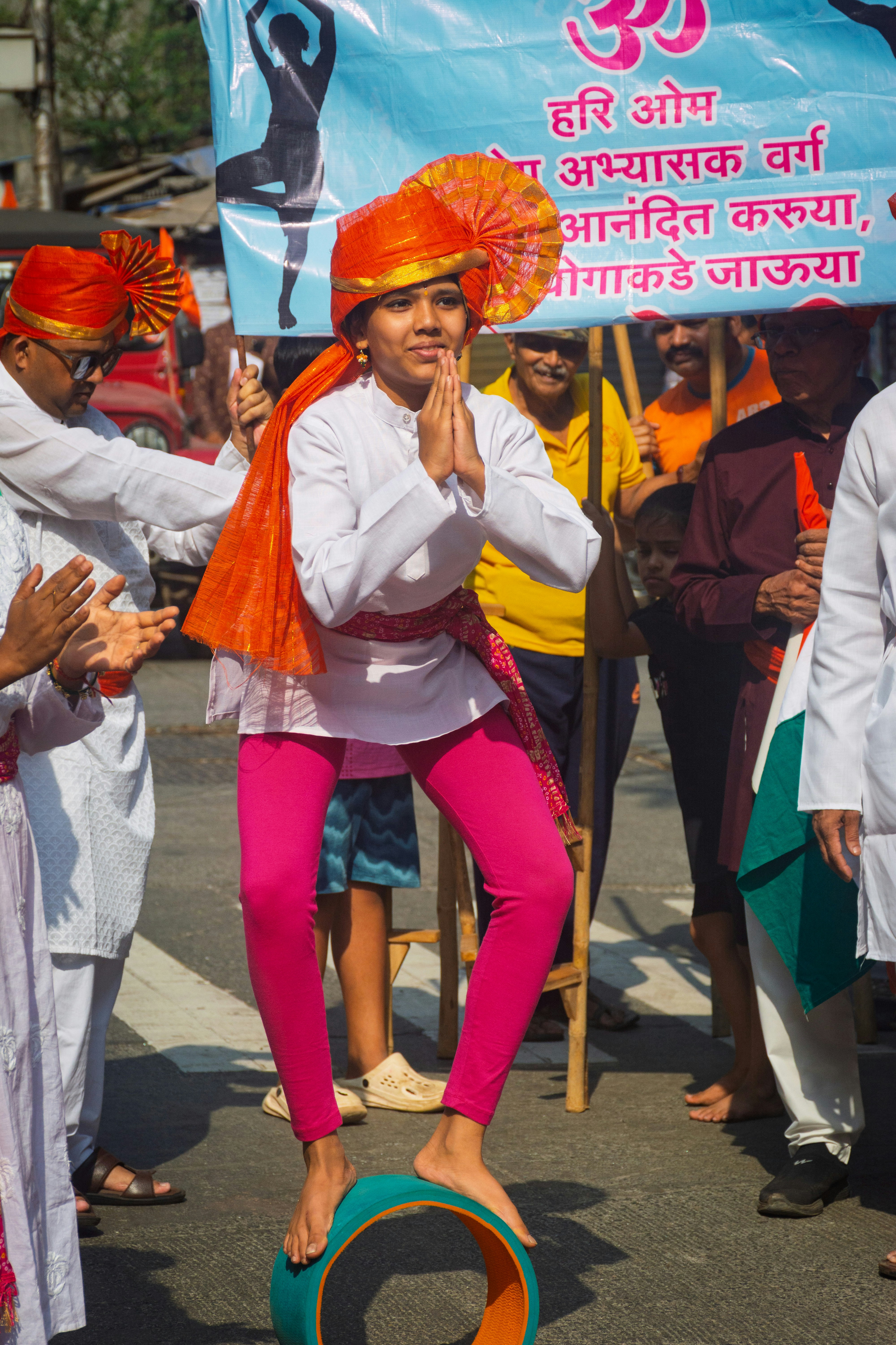 Balance on Beat: Yoga Pose in a Street Procession