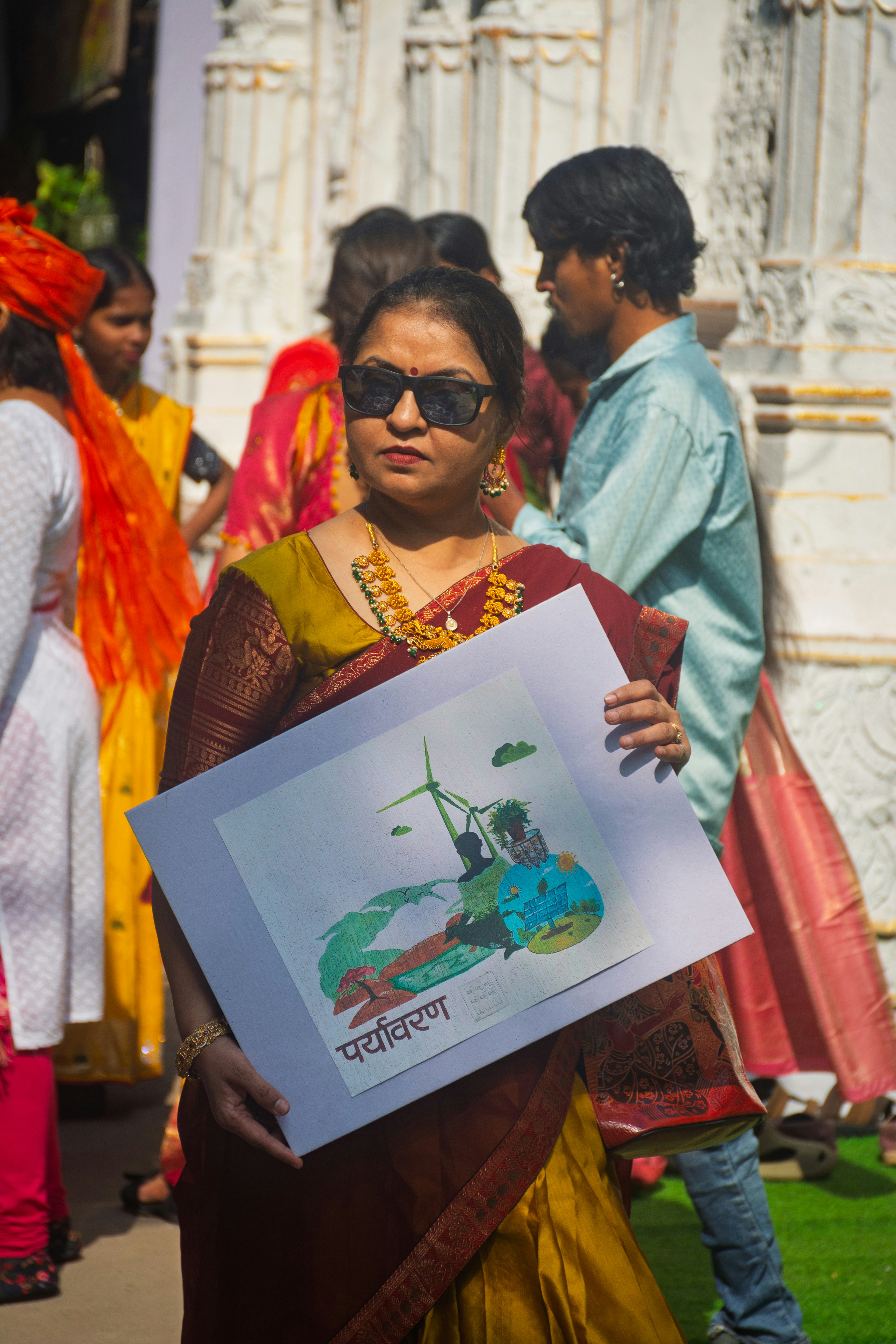 Festival Attire and Artwork at a Colorful Cultural Gathering
