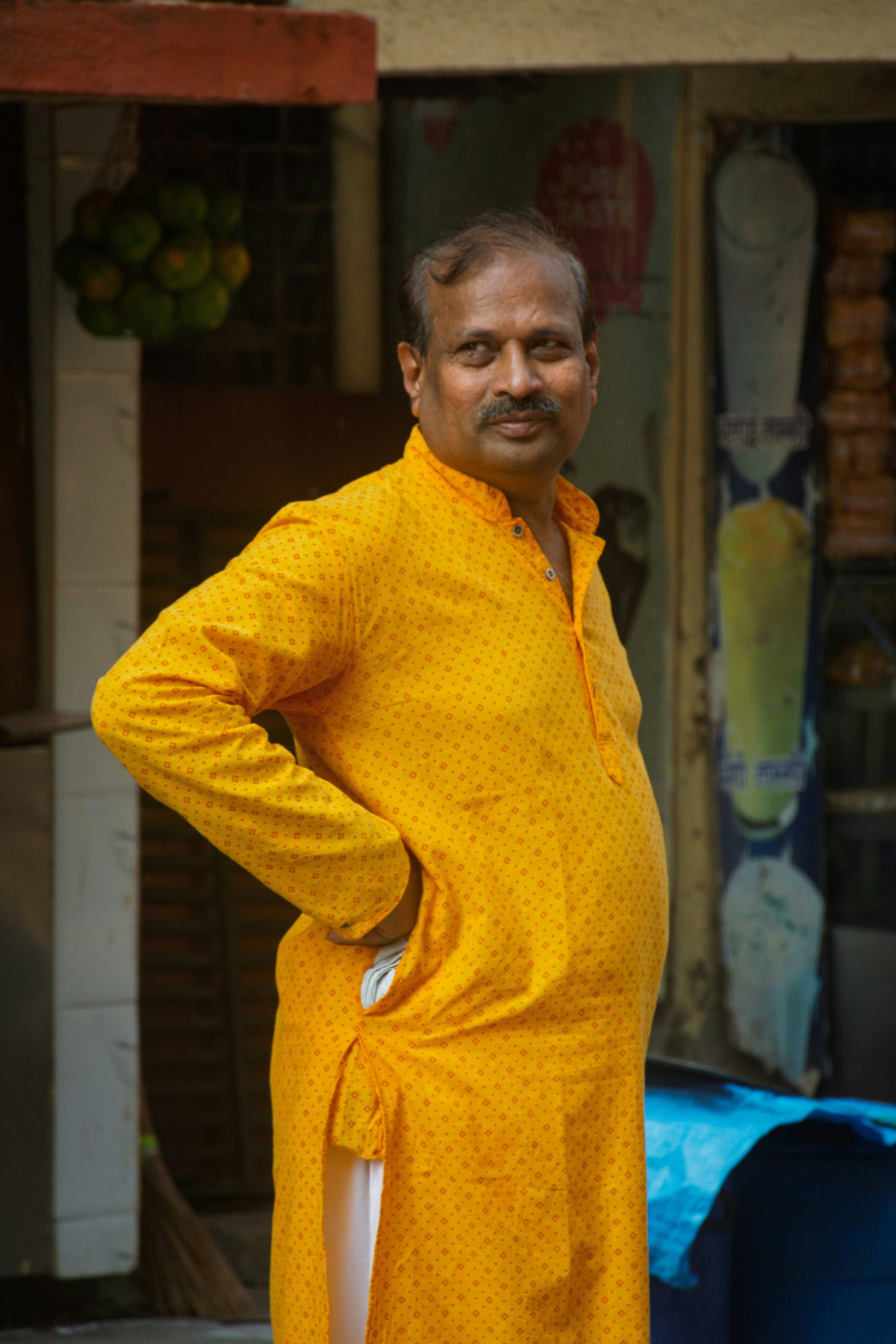 Bright Kurta, Quiet Confidence: A Street Portrait in Golden Hue