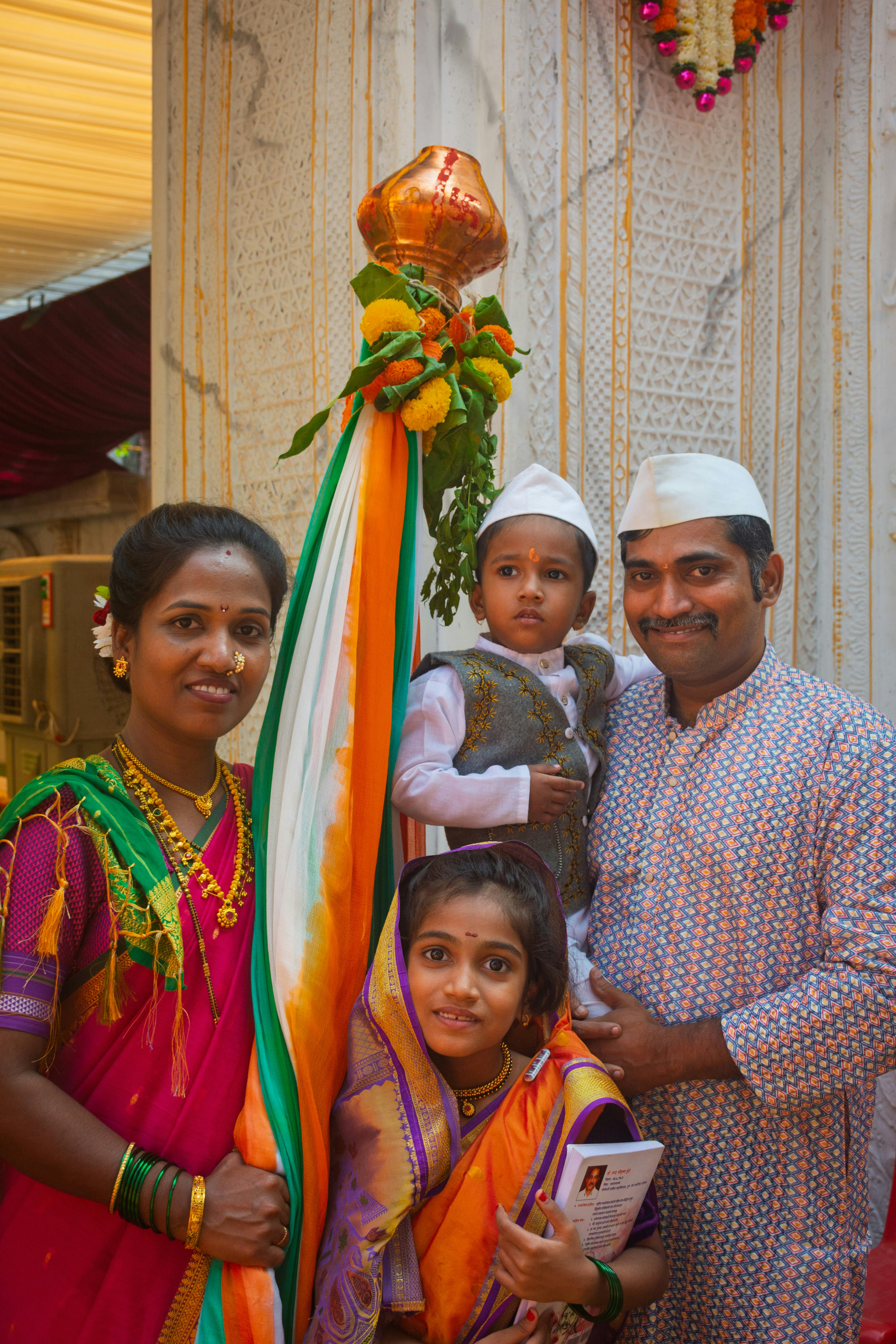 Family Portrait at the Temple Ceremony with Umbrella Vessel