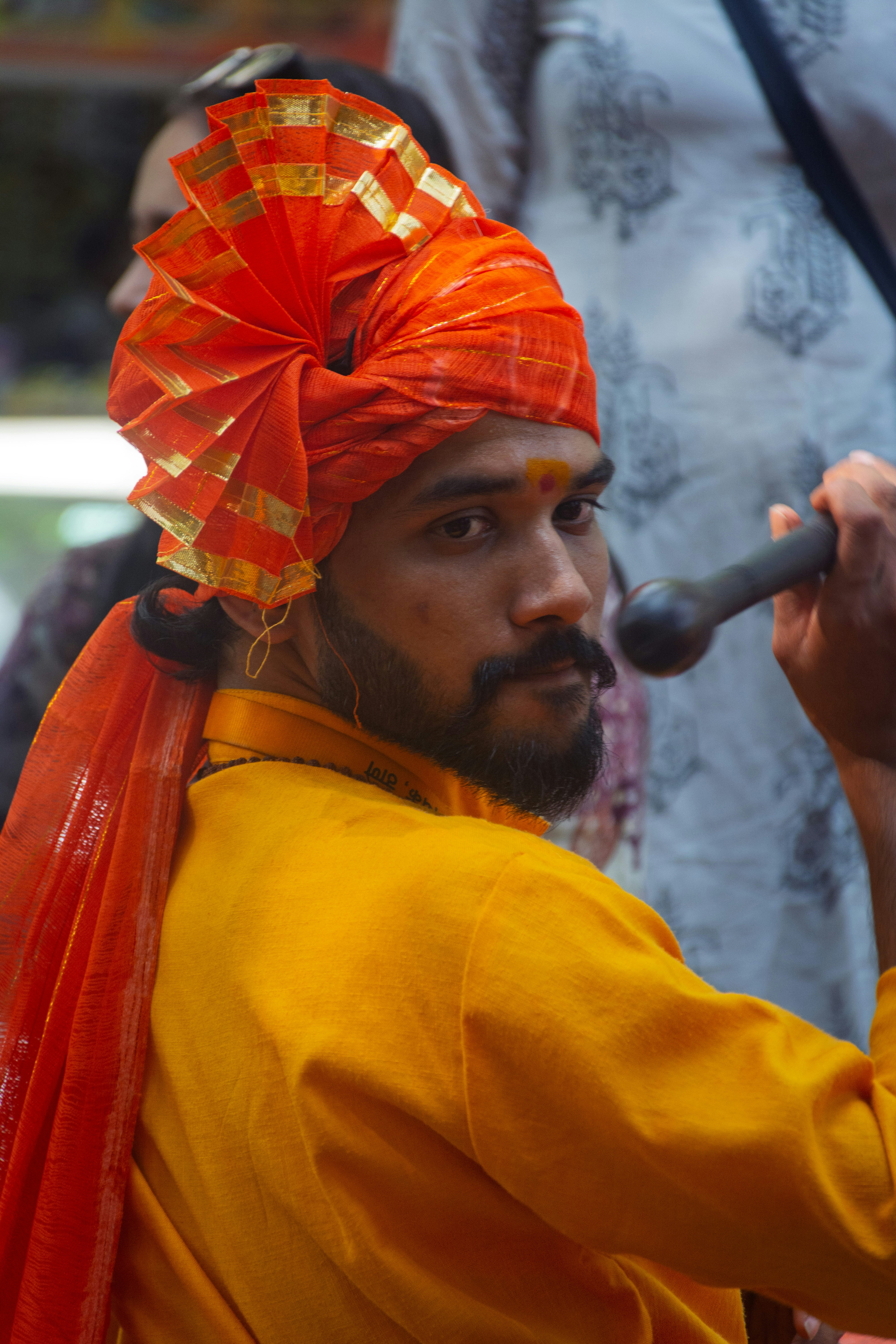 Vibrant Turban and Focused Gaze of a Bhawaiya Performer