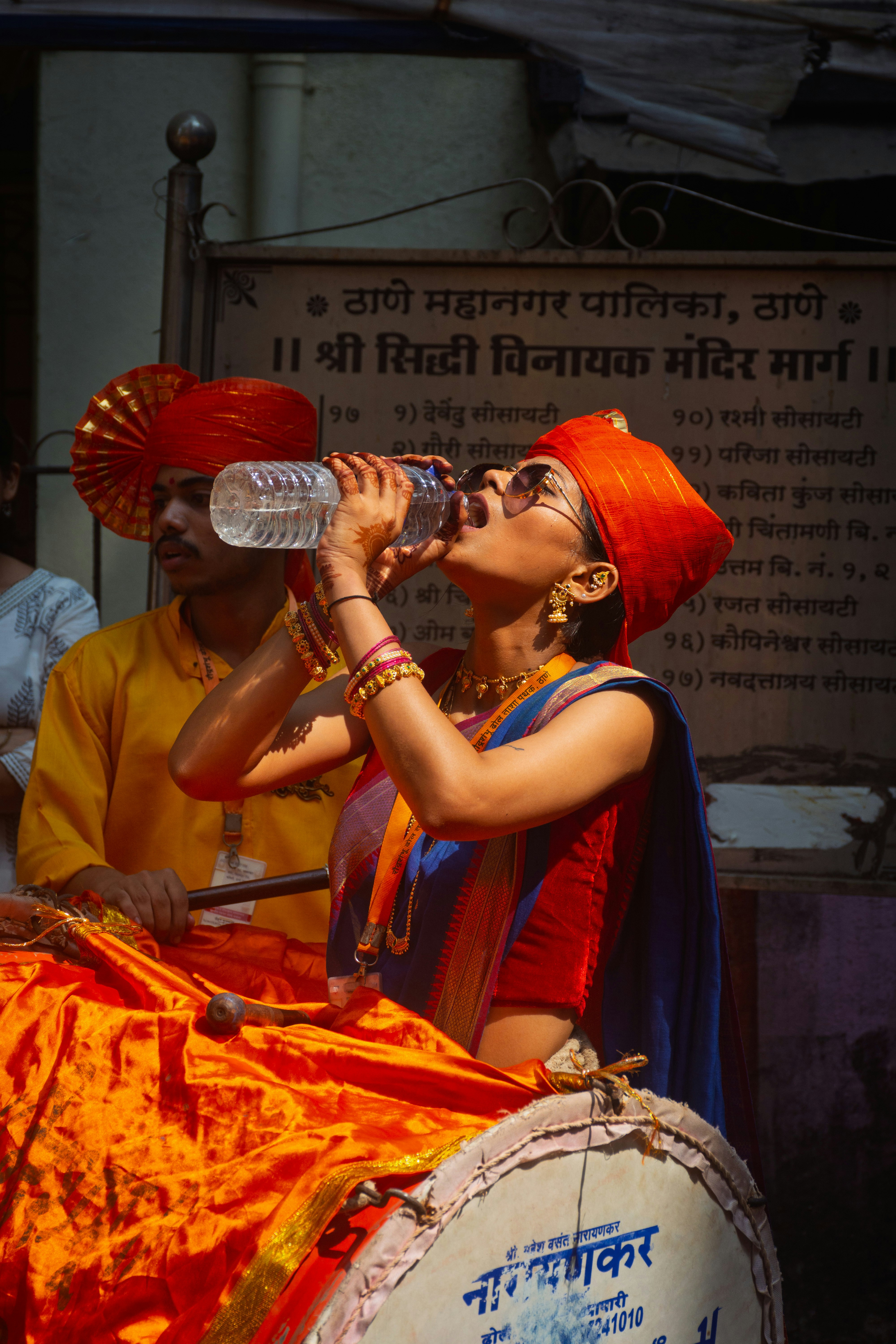 Hydration in Rhythm: A Drum and Dance Moment at a Festival