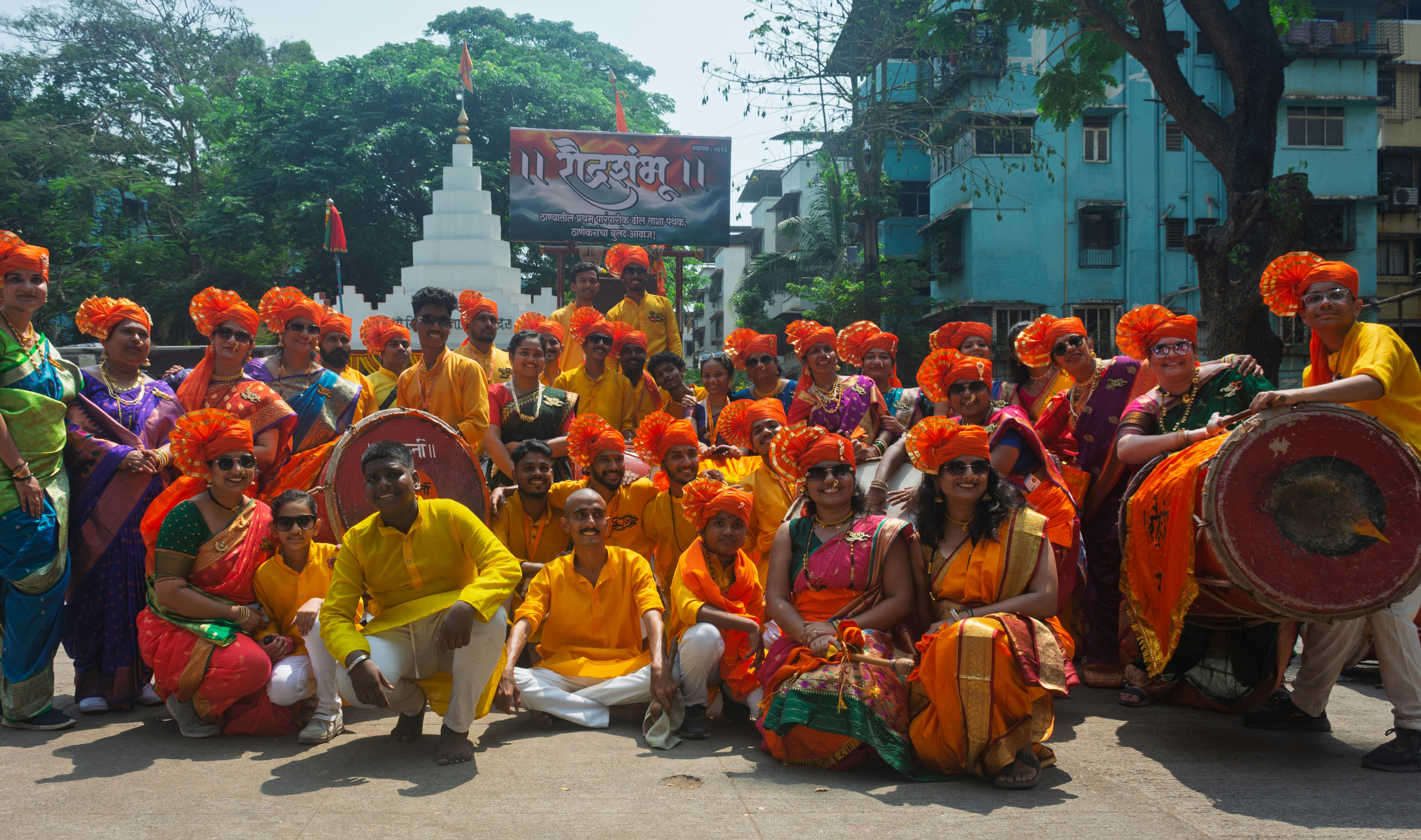 Vibrant Rhythm: A Colorful Festival Group Shot in the Street