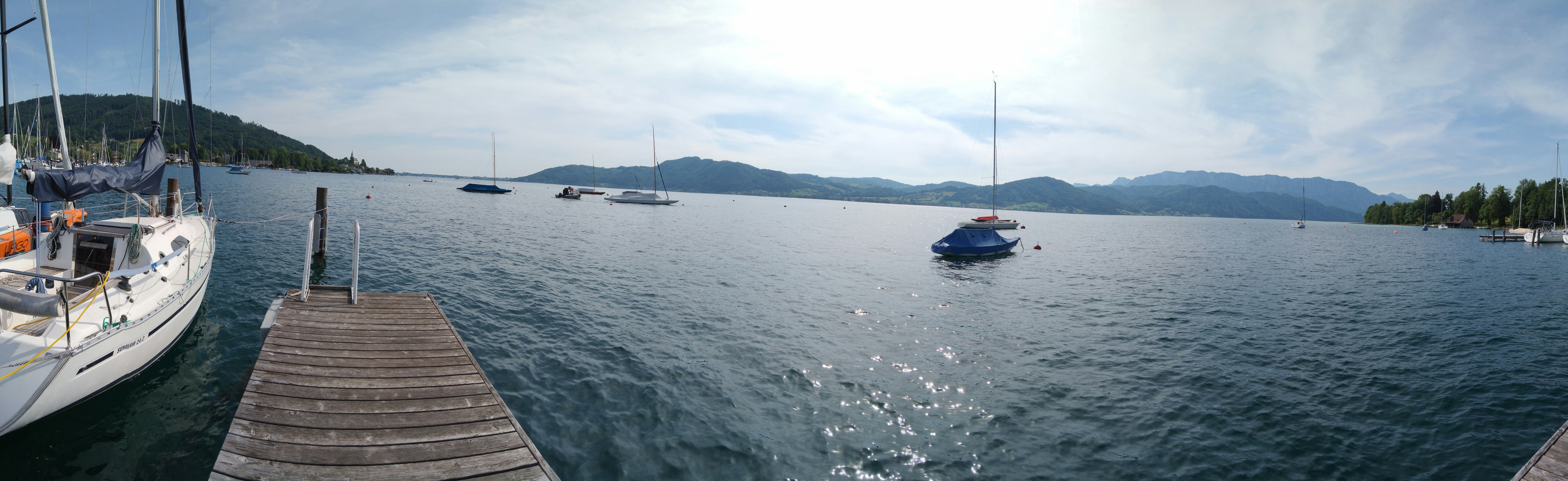 Pier Sails and Sparkling Harbor: A Panoramic Marina Morning