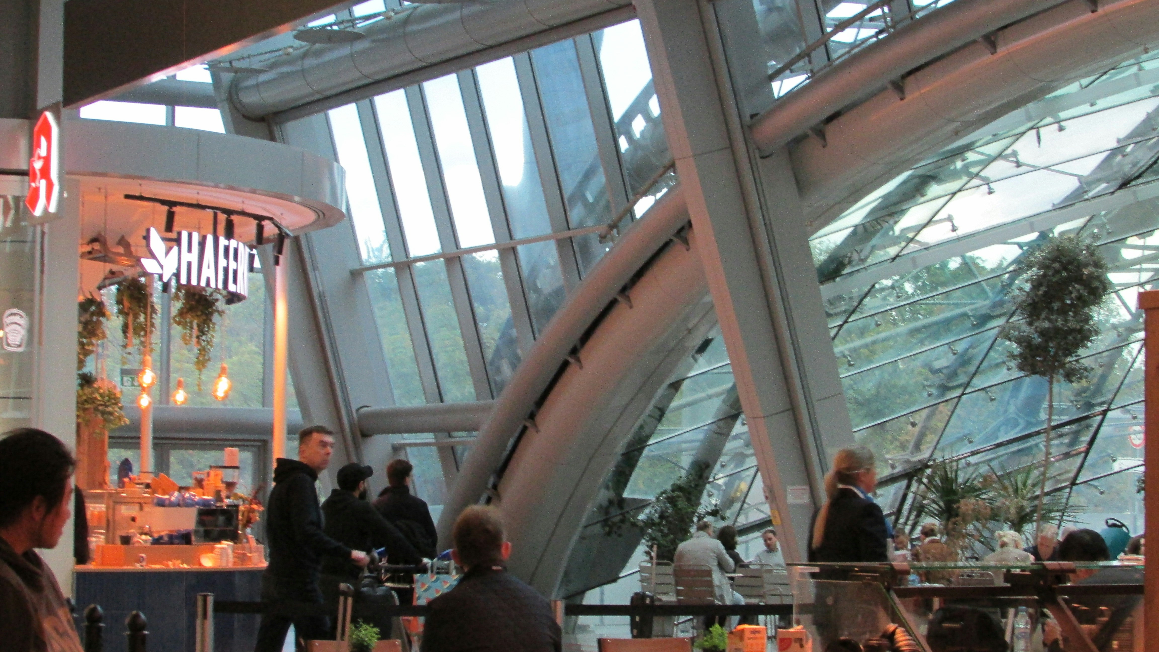 Glass atrium cafe in motion by the lakefront