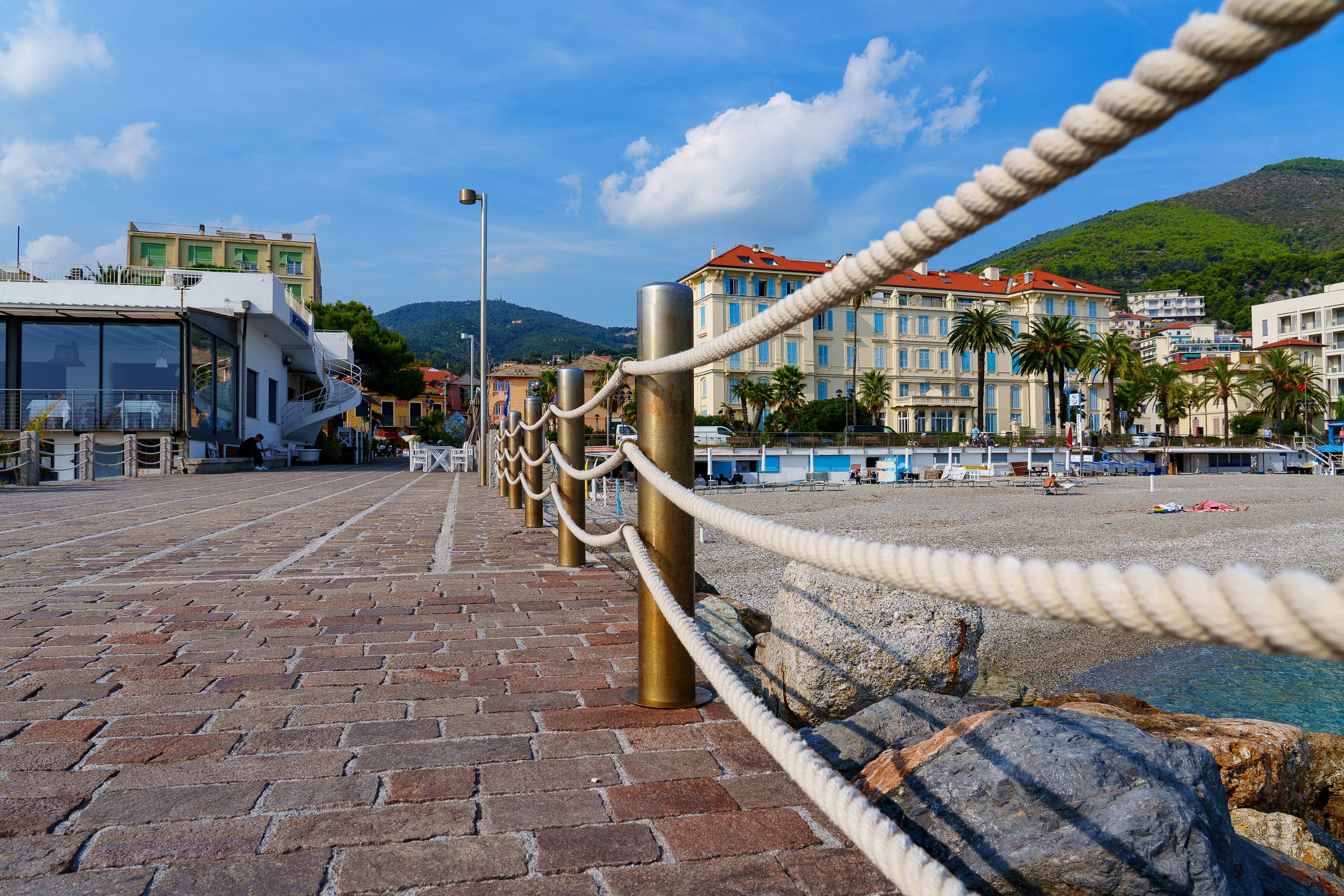 Rope Barrier Leading to a Sunny Mediterranean Promenade
