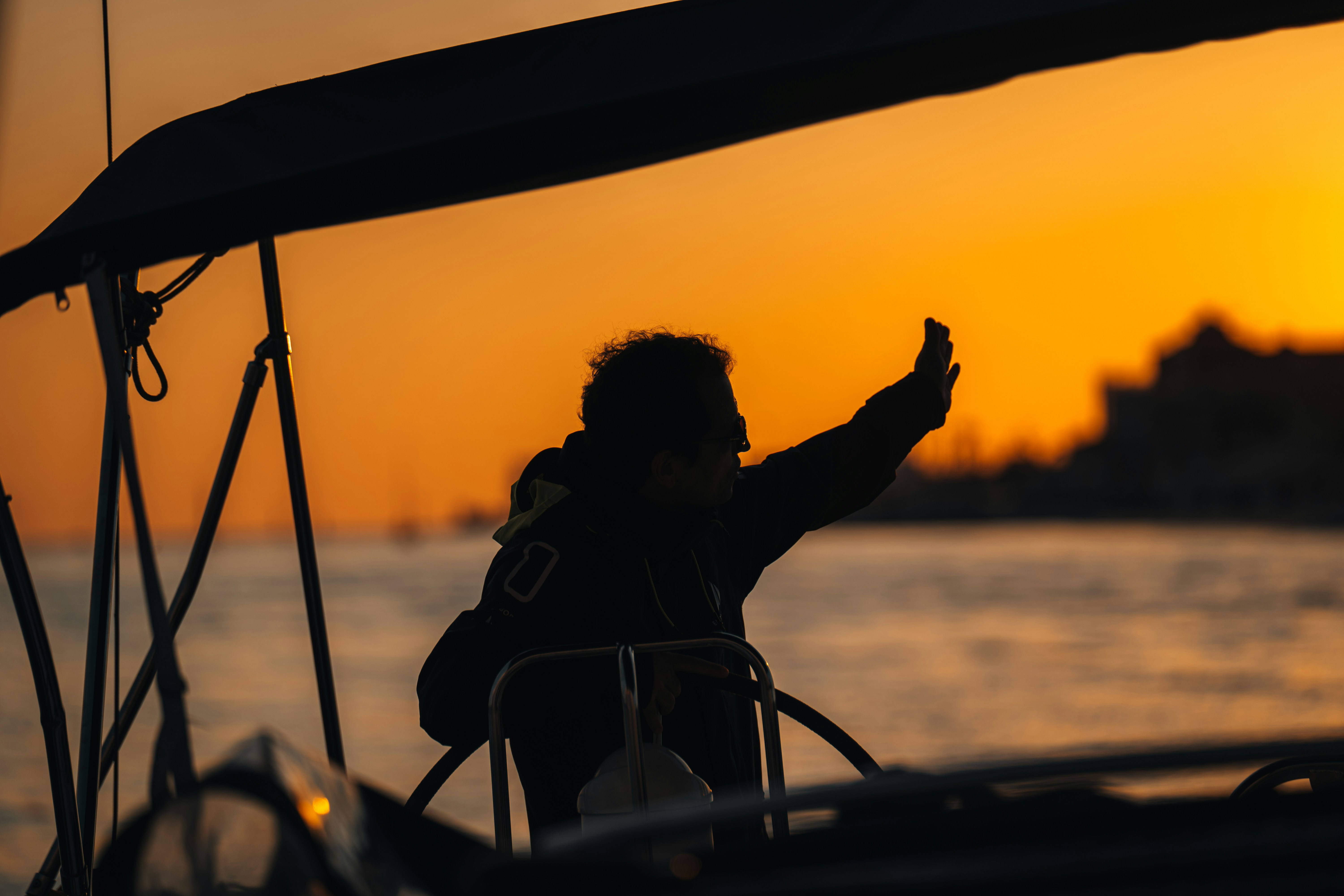 Sunset Silhouette at the Helm