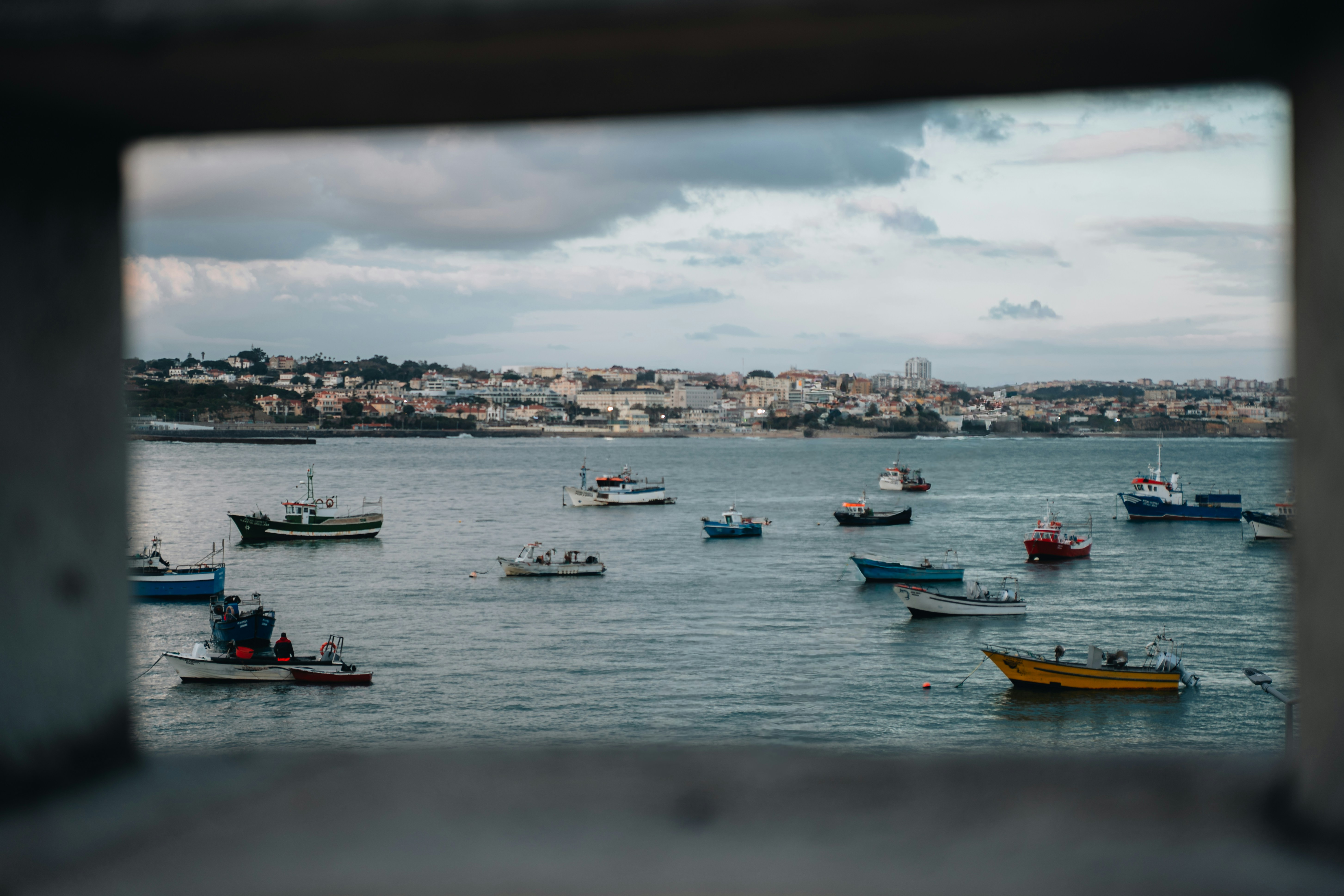 Harbor Birds-eye: Boats Crown the Quiet Sea Framed by Dusk
