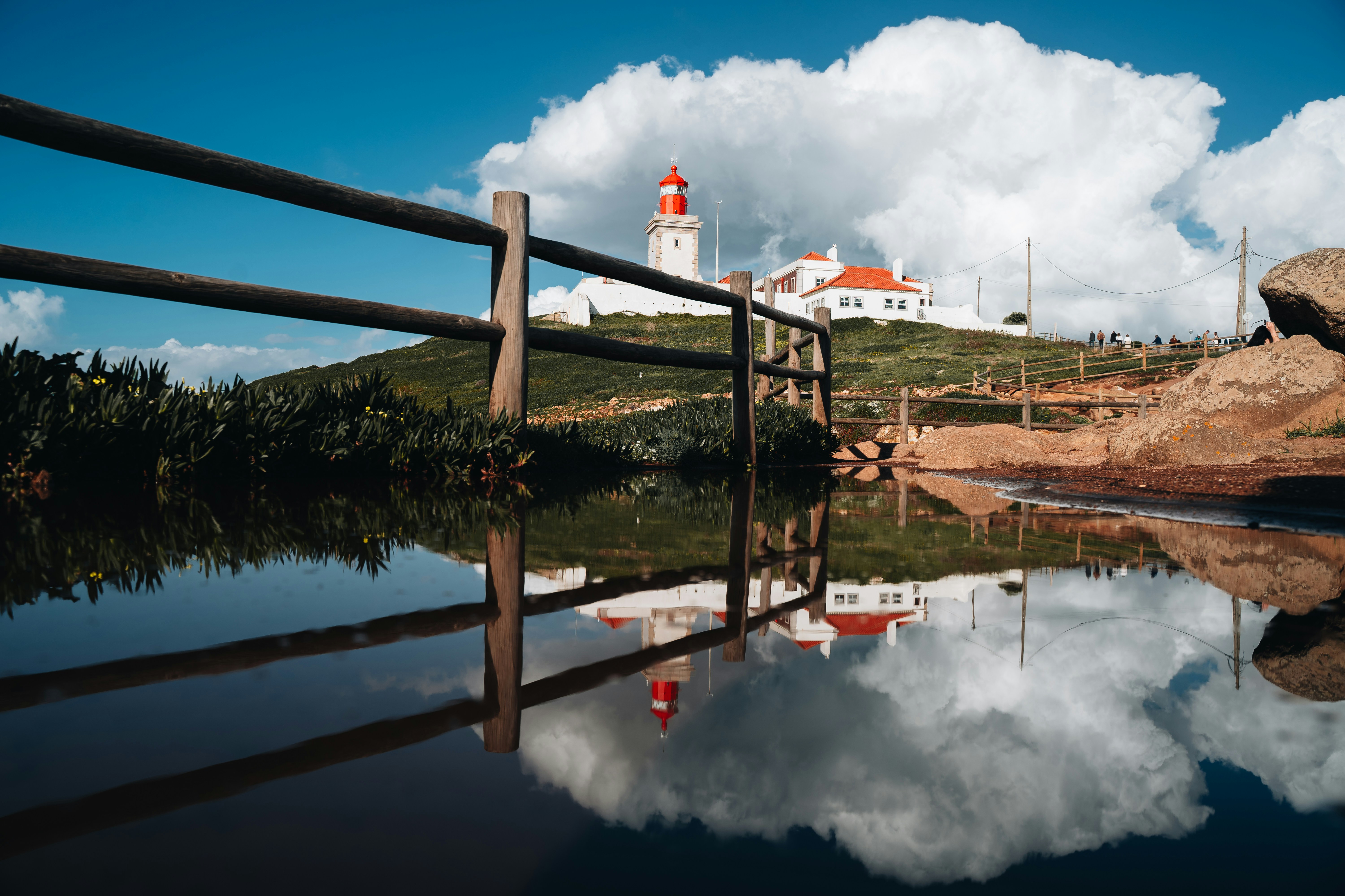 Lighthouse Reflections: A Coastal Mirror