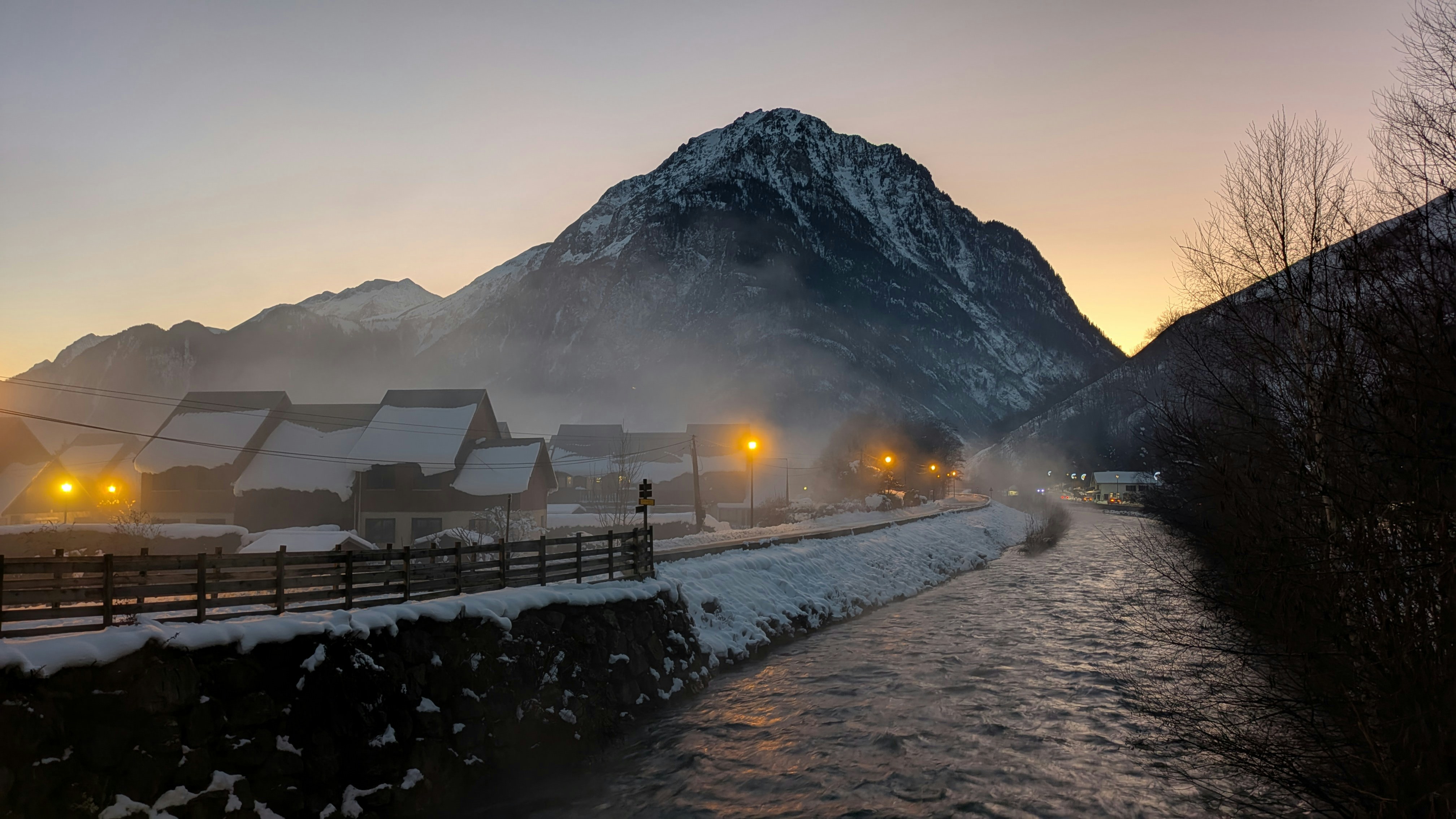 Snowbound Village at Dusk: A Mountain Guarded by Twilight