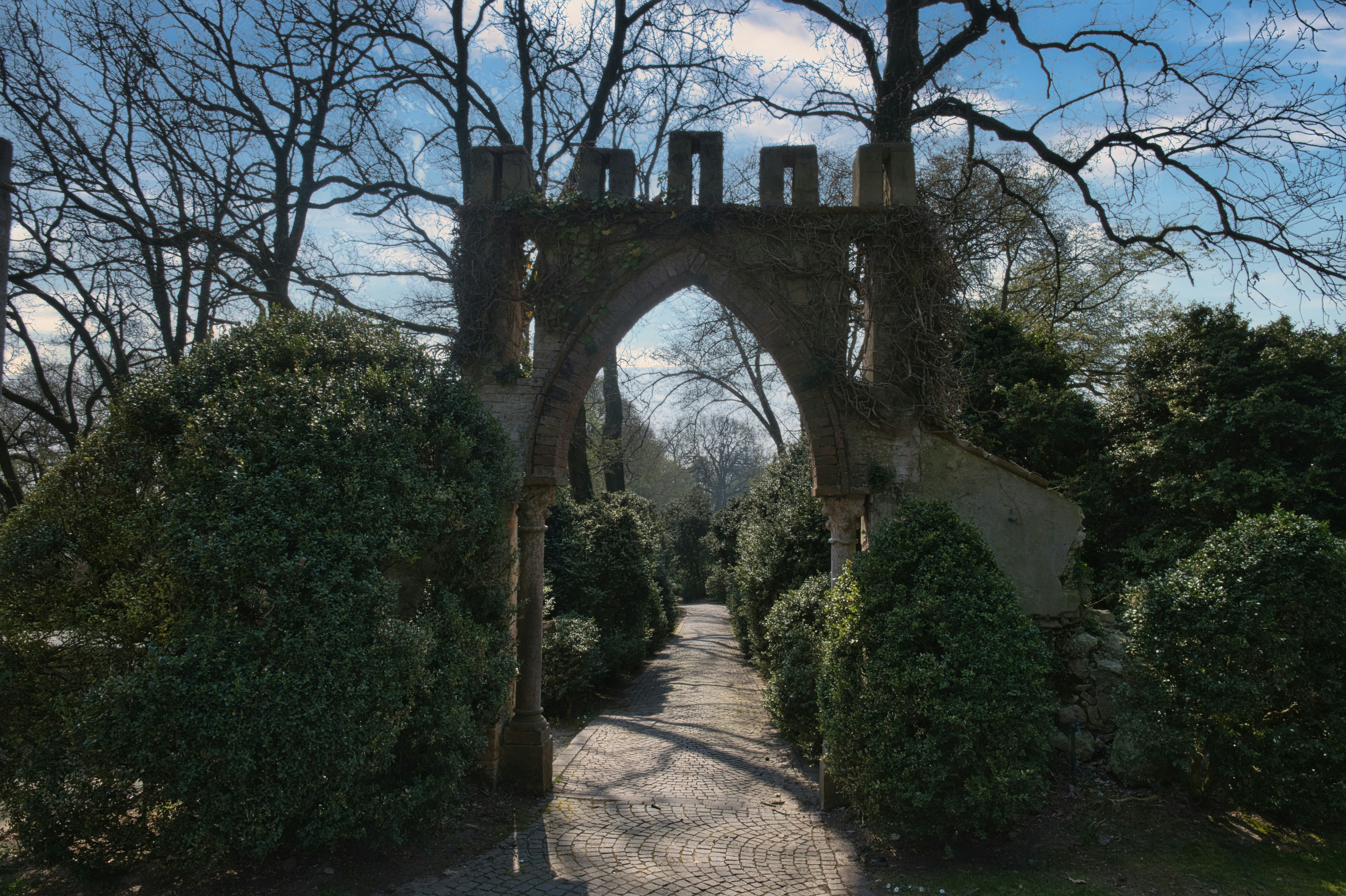 Sunlit Archway Garden Pathway