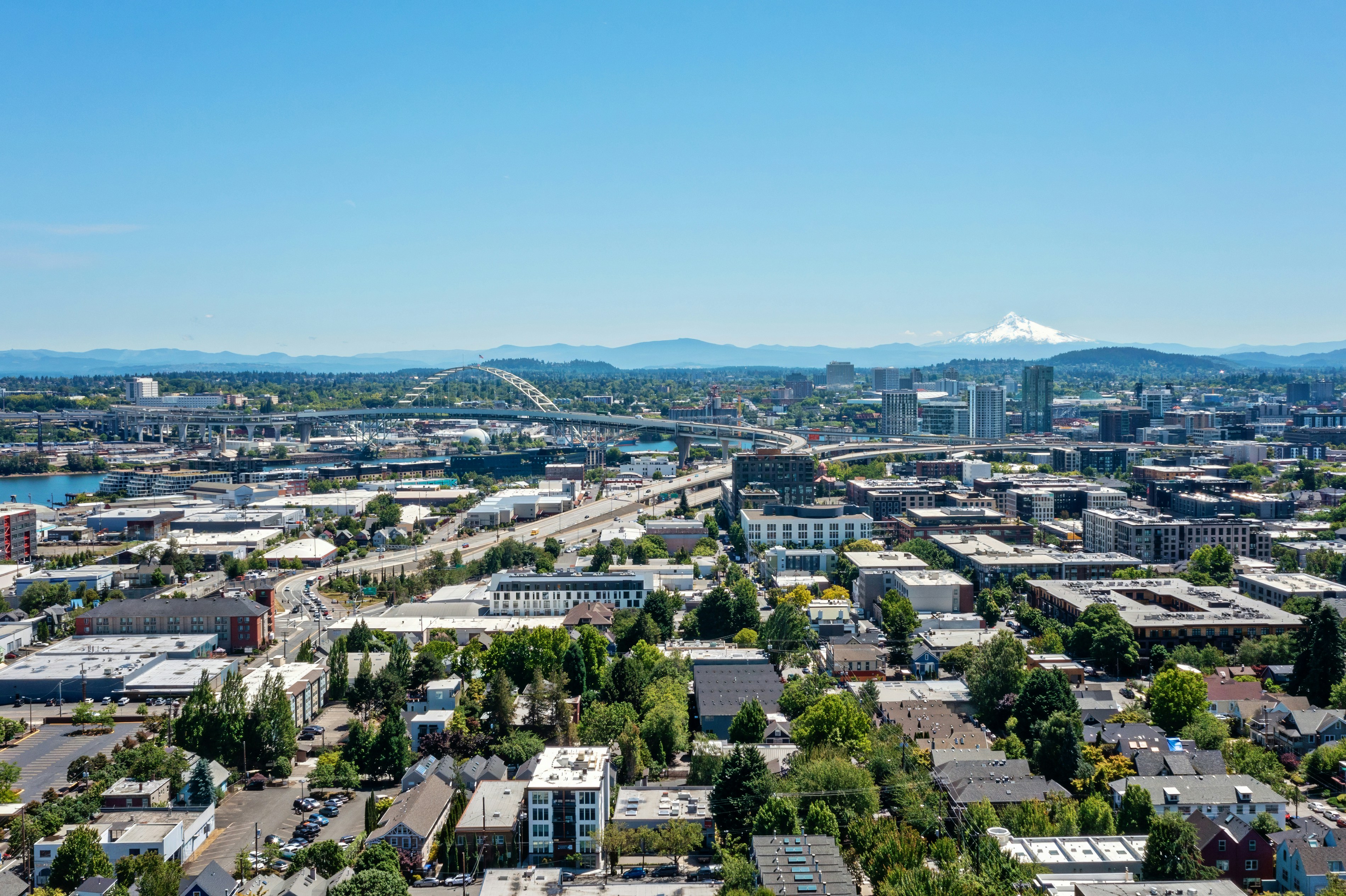 Aerial Tapestry: City Grid Under a Clear Cascade