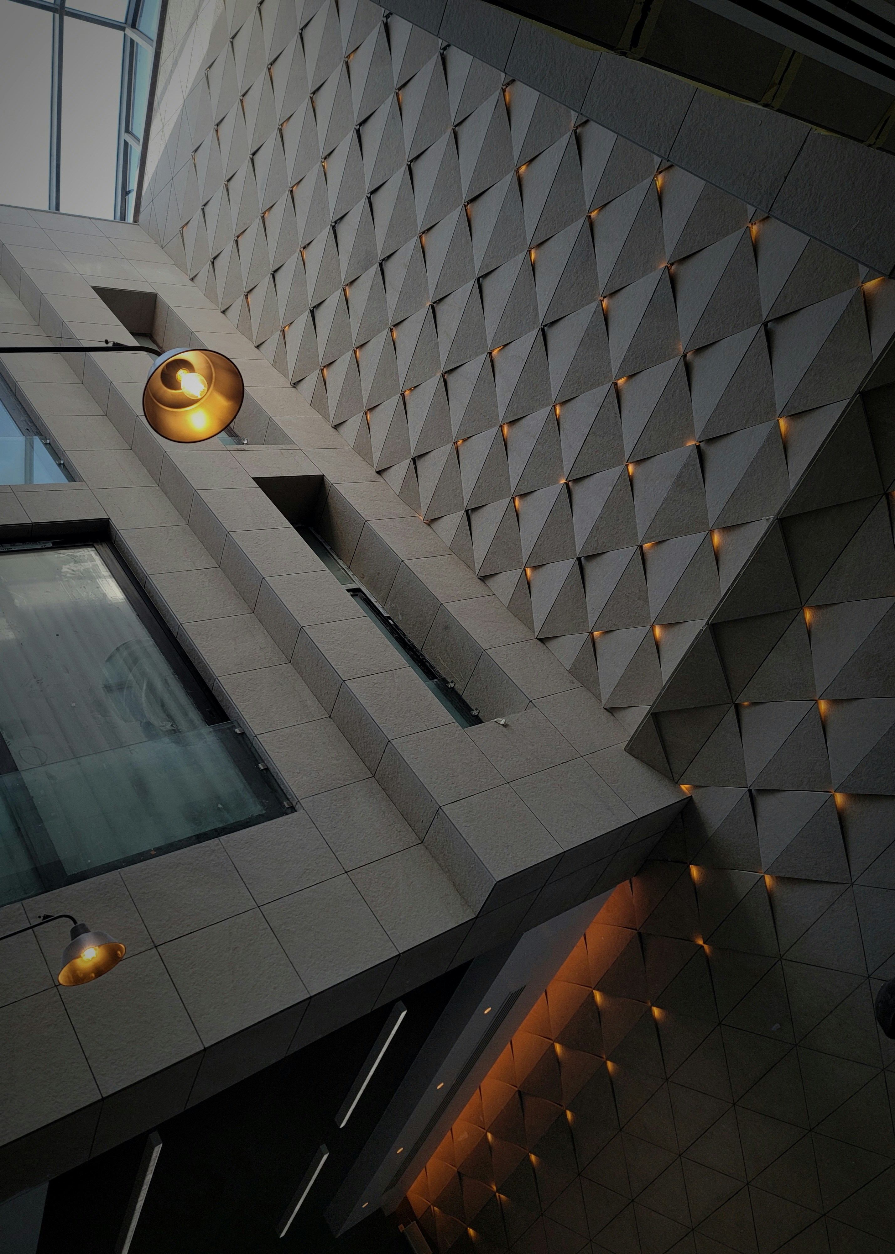 Angle of Illumination: Geometric Facade under Warm Lights