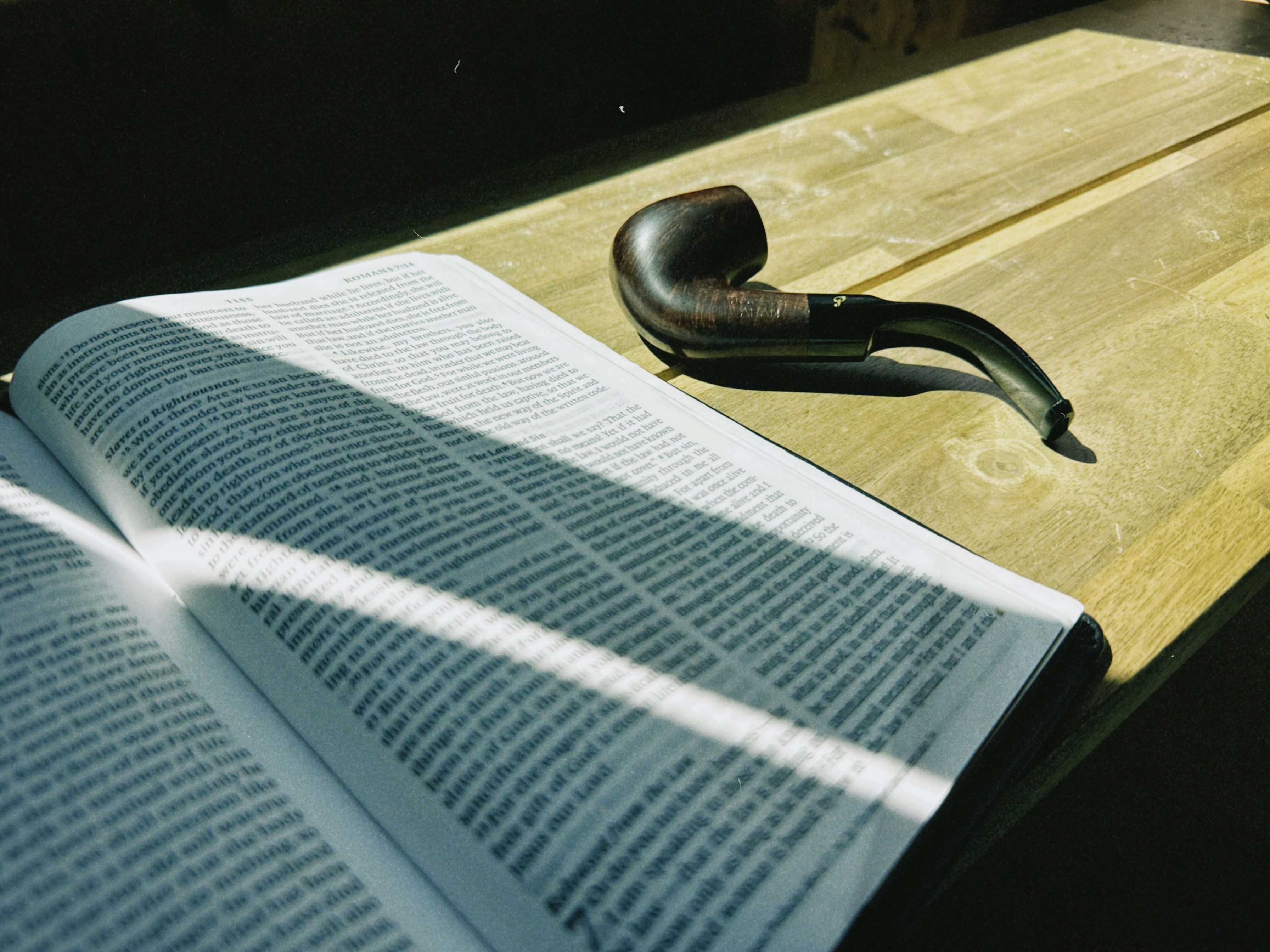 Sunlit Pages: A Quiet Study Bench under a Beams of Light