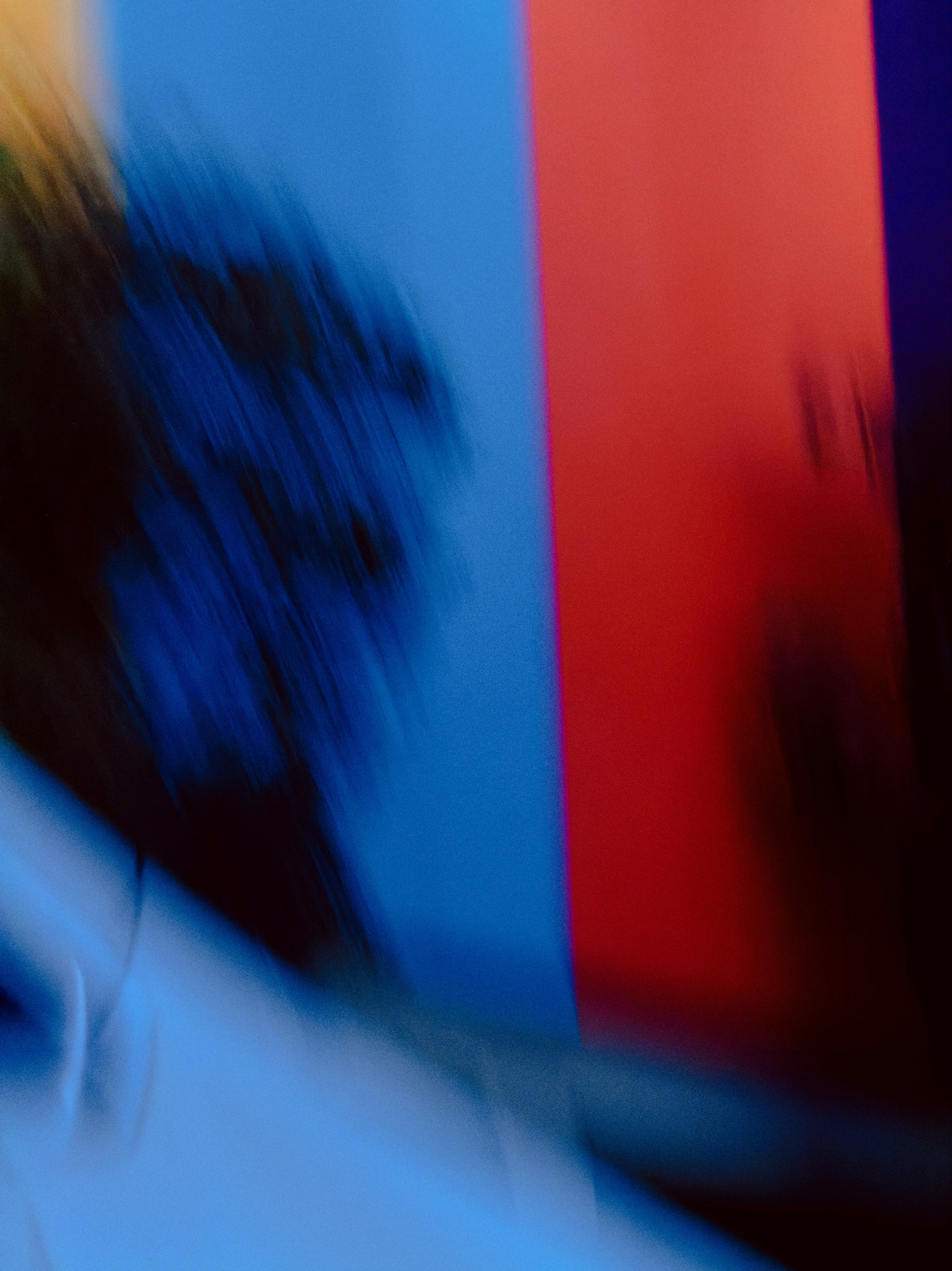 Blurred Neon Drift: A Portrait of Color Stripes in Motion