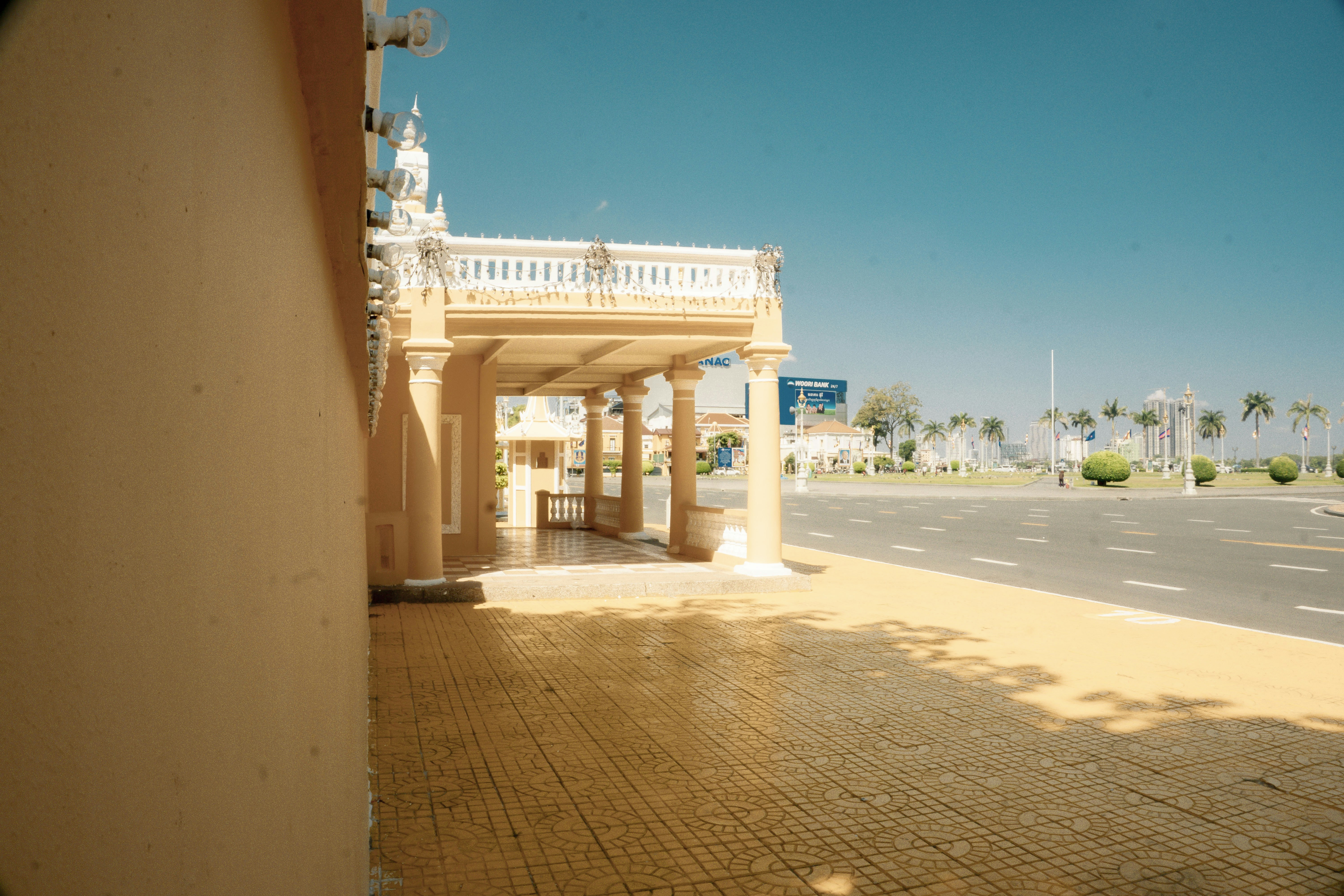 Sunlit Arcade: A Quiet Corridor of Colonnades by the Gulf
