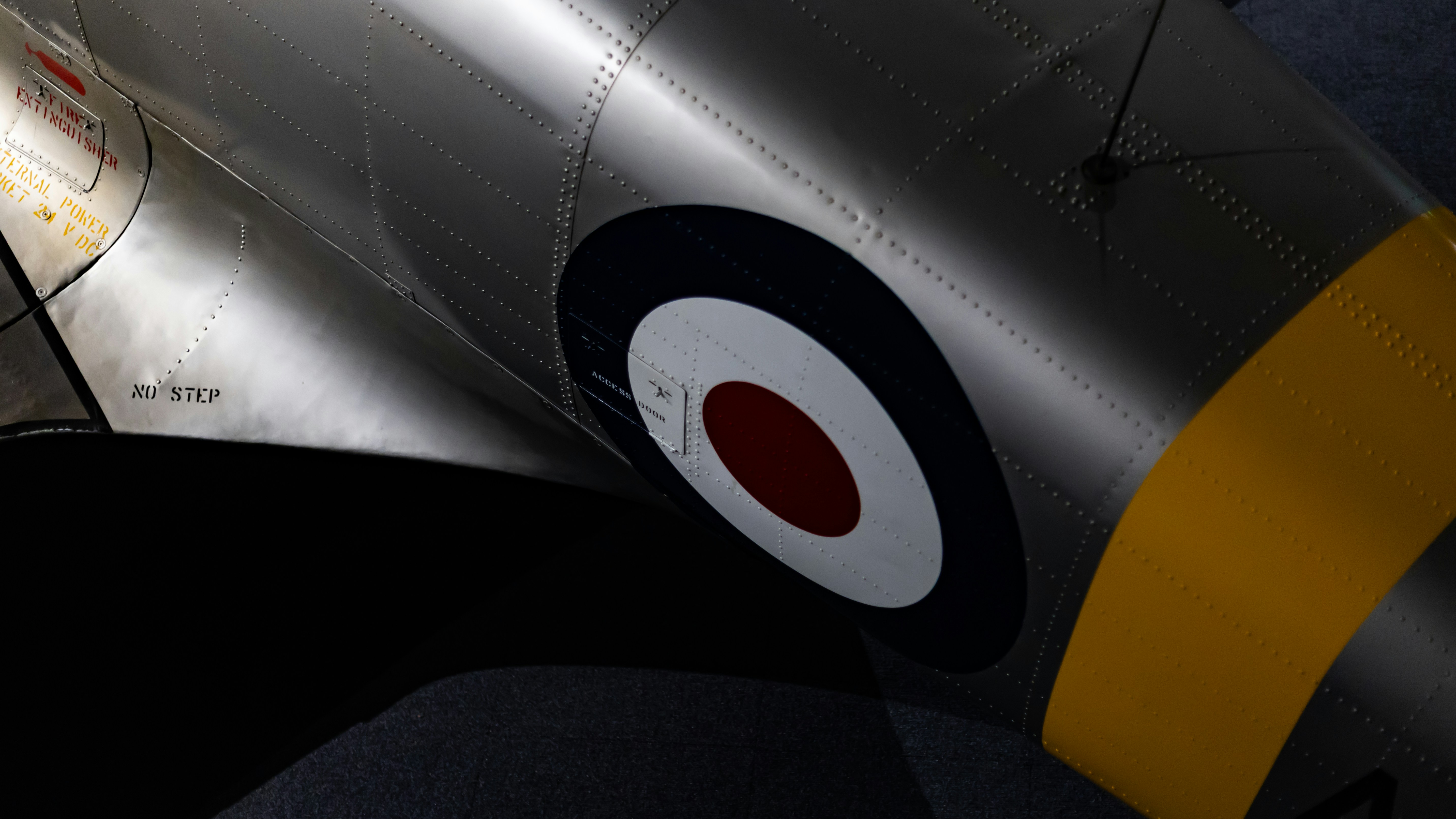 Retro Silver Jet with Rounds: Close-up of an RAF-style Roundel and Nose Detail