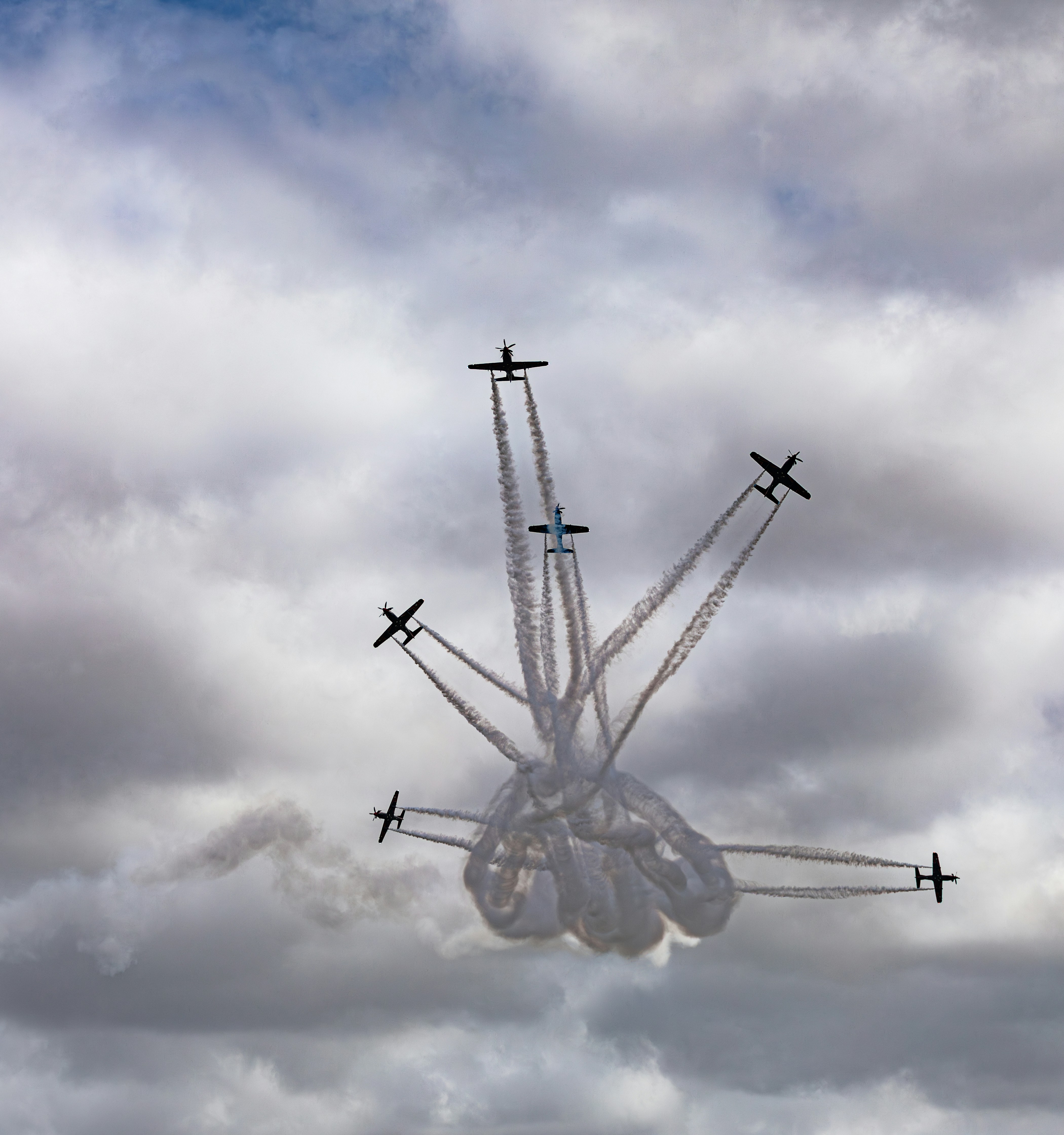 Five-Wold Smoke Ballet: Aerial Display Converges in a Cloud Graffiti