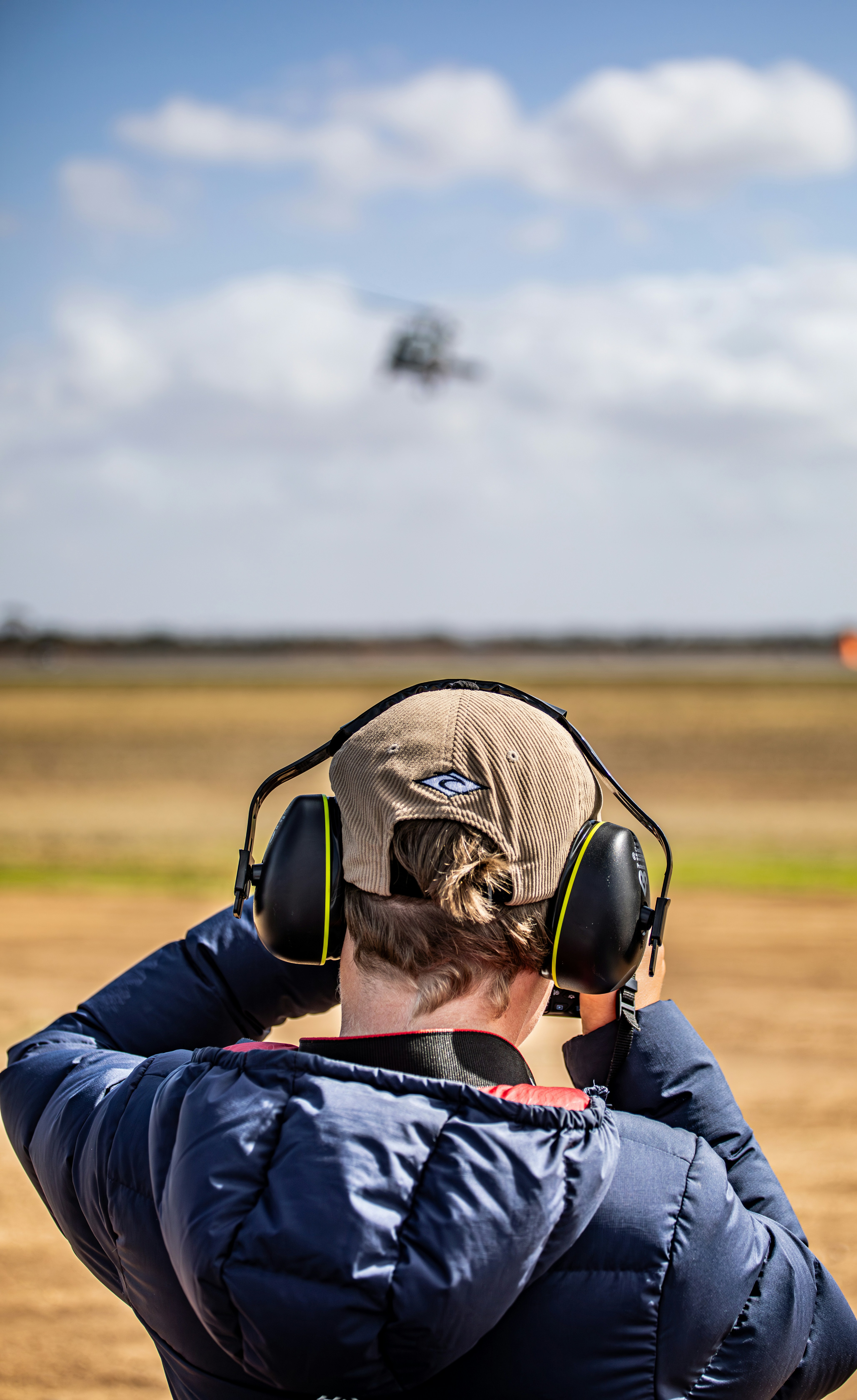 Headphones and Horizon: A Ground-Level View from the Grounded Pilot