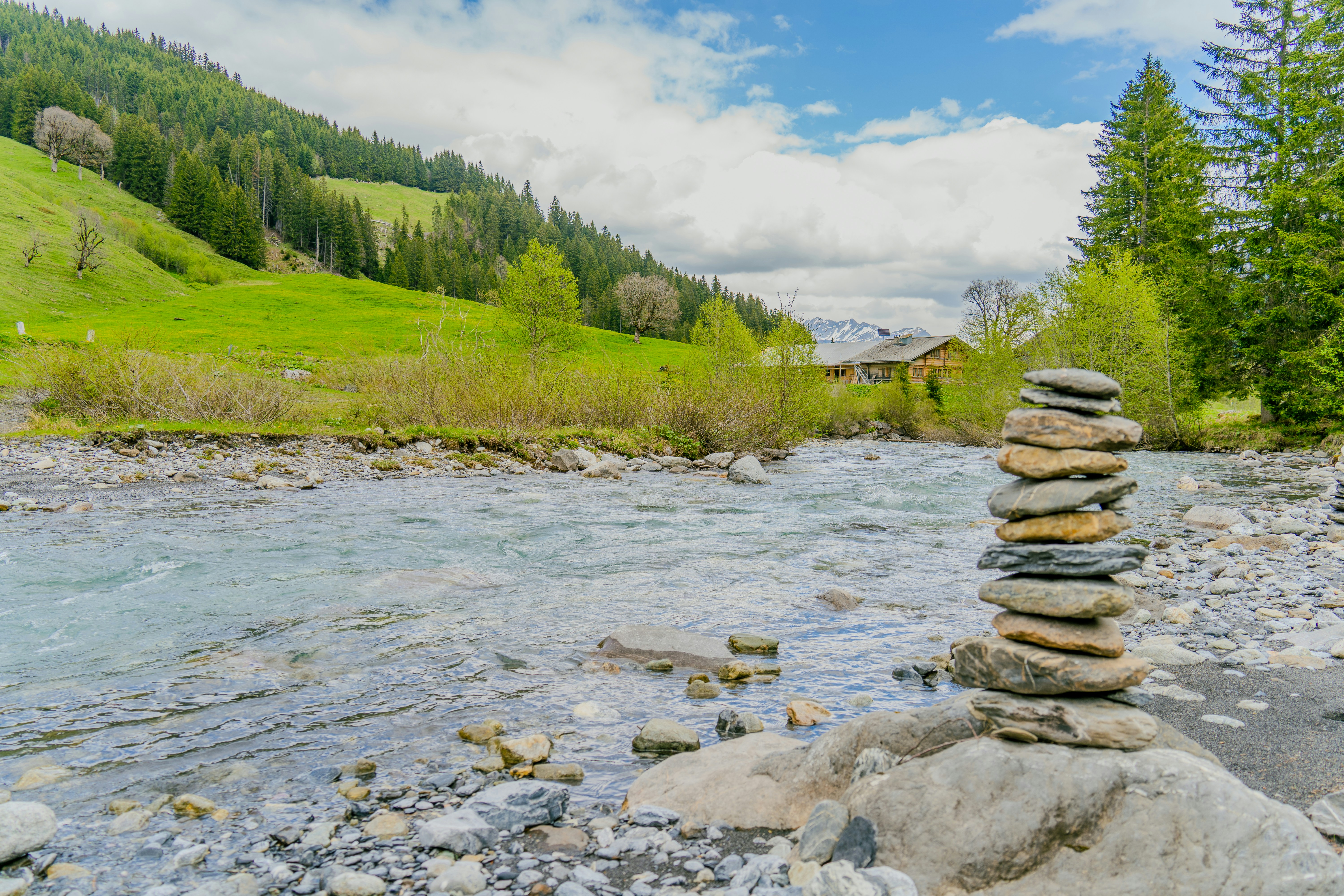 Stacked Stones by a Mountain Stream