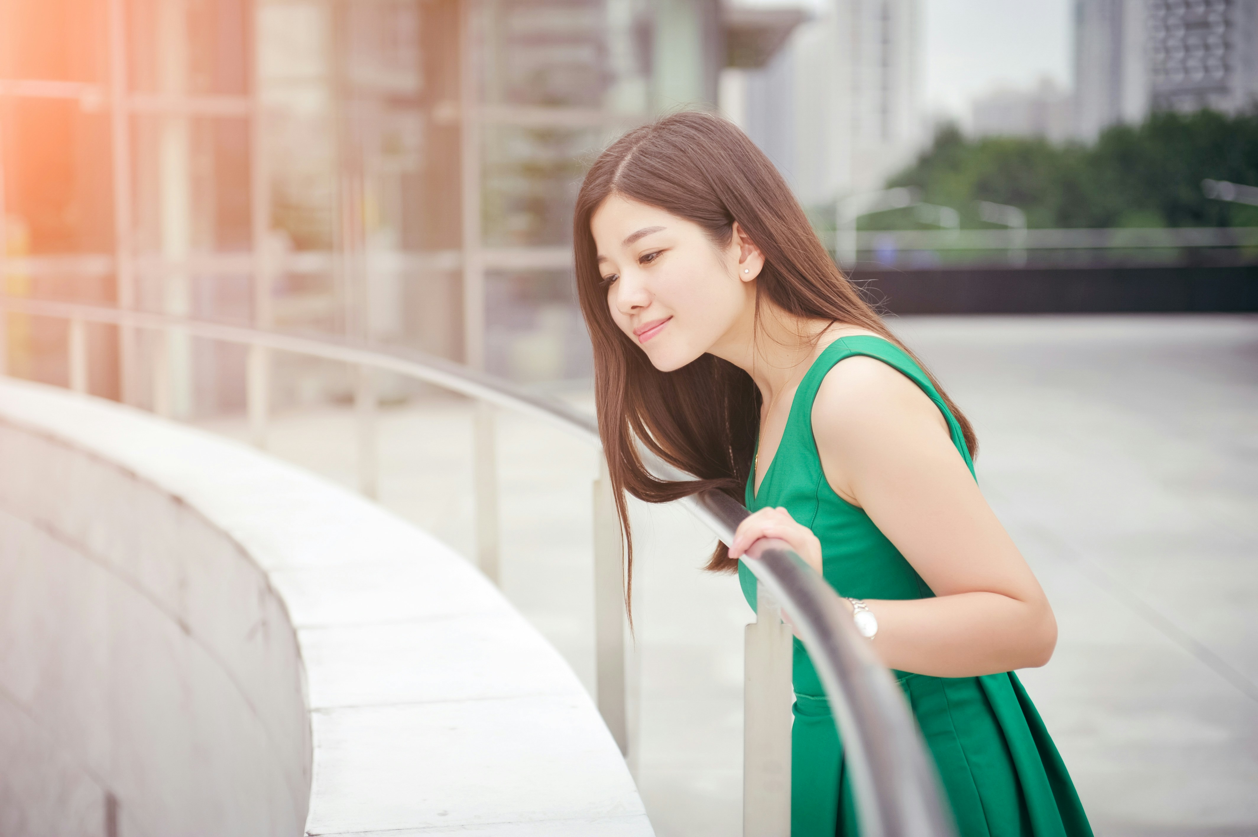 Green Dress Overlooking the City Rail