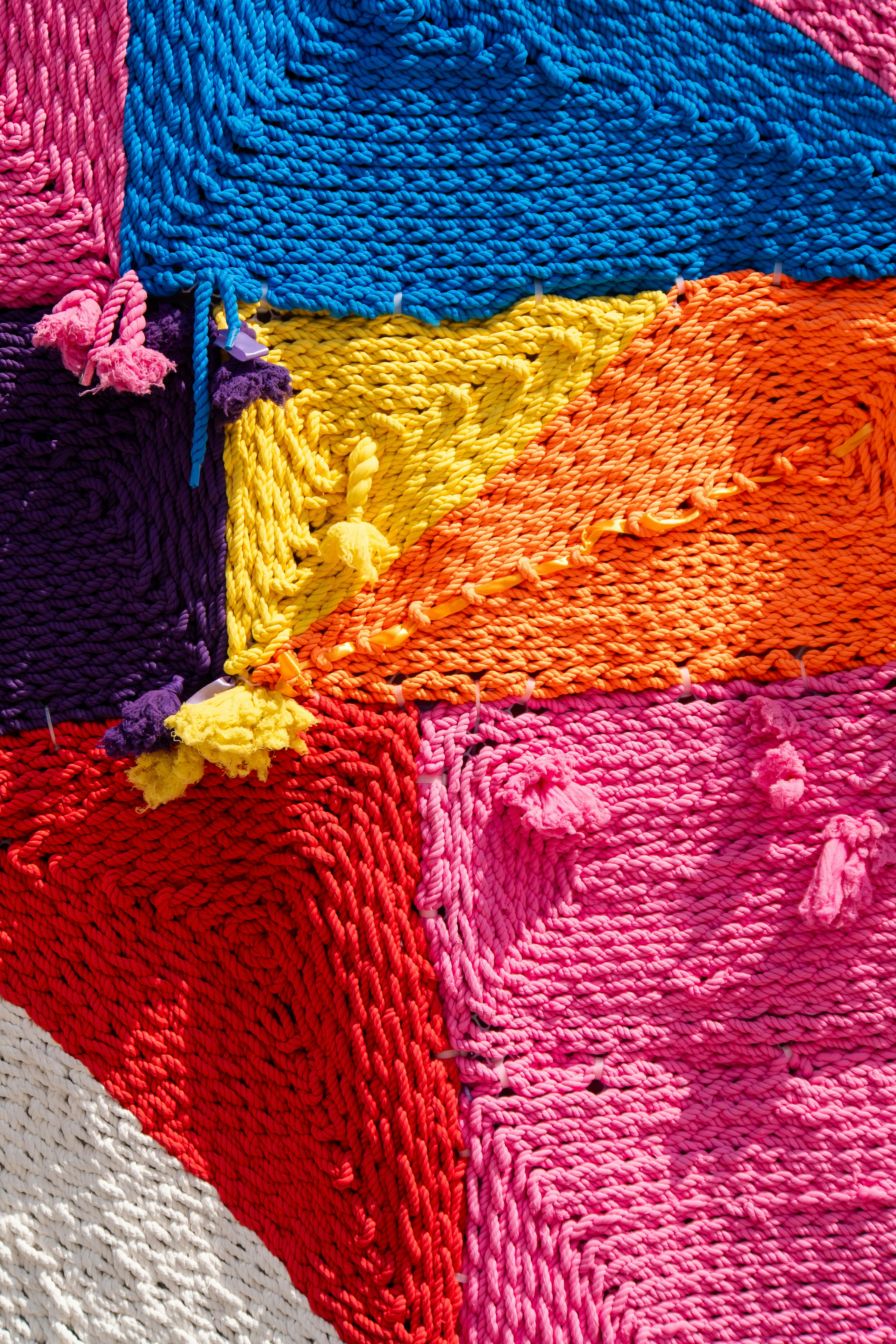 Vivid Knots: A Textile Mosaic of Color and Texture