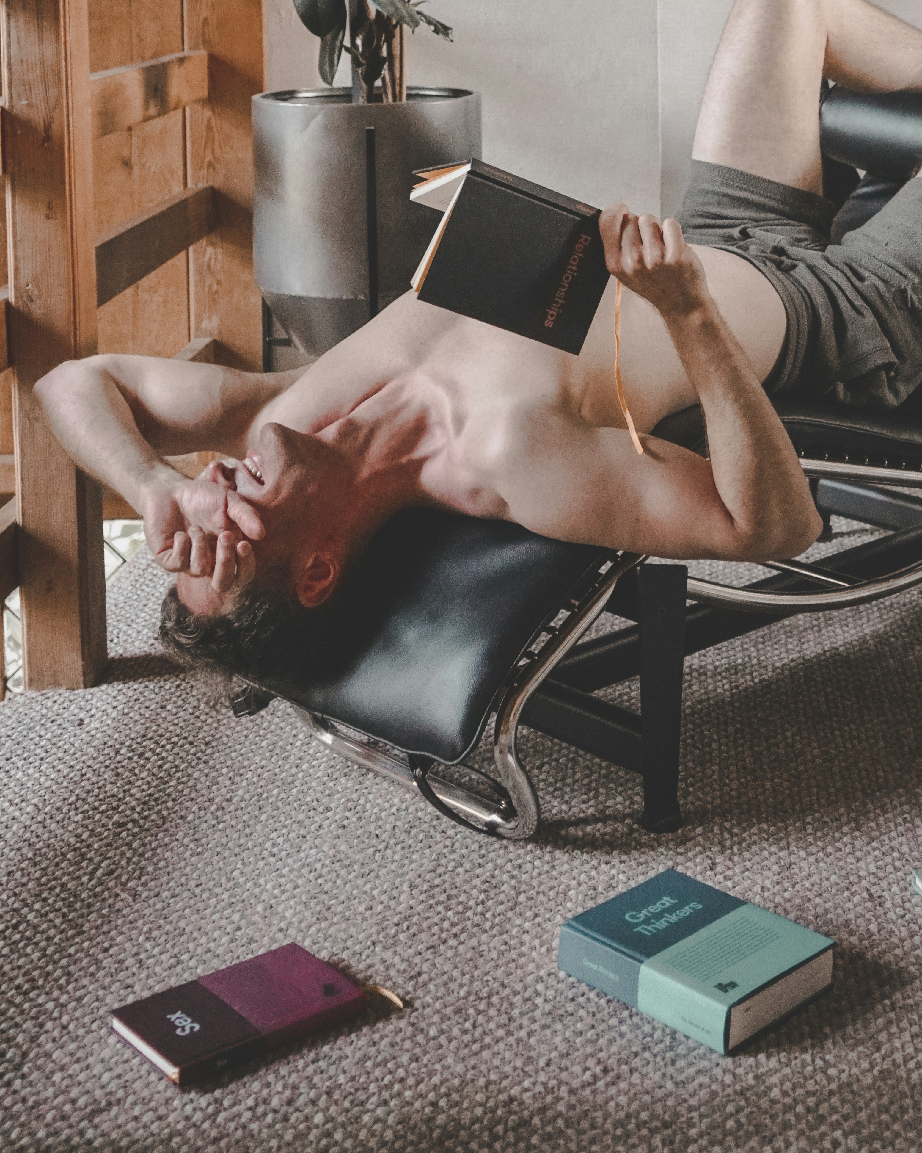 Opposite of Routine: A Relaxed Moment with a Book on a Bench