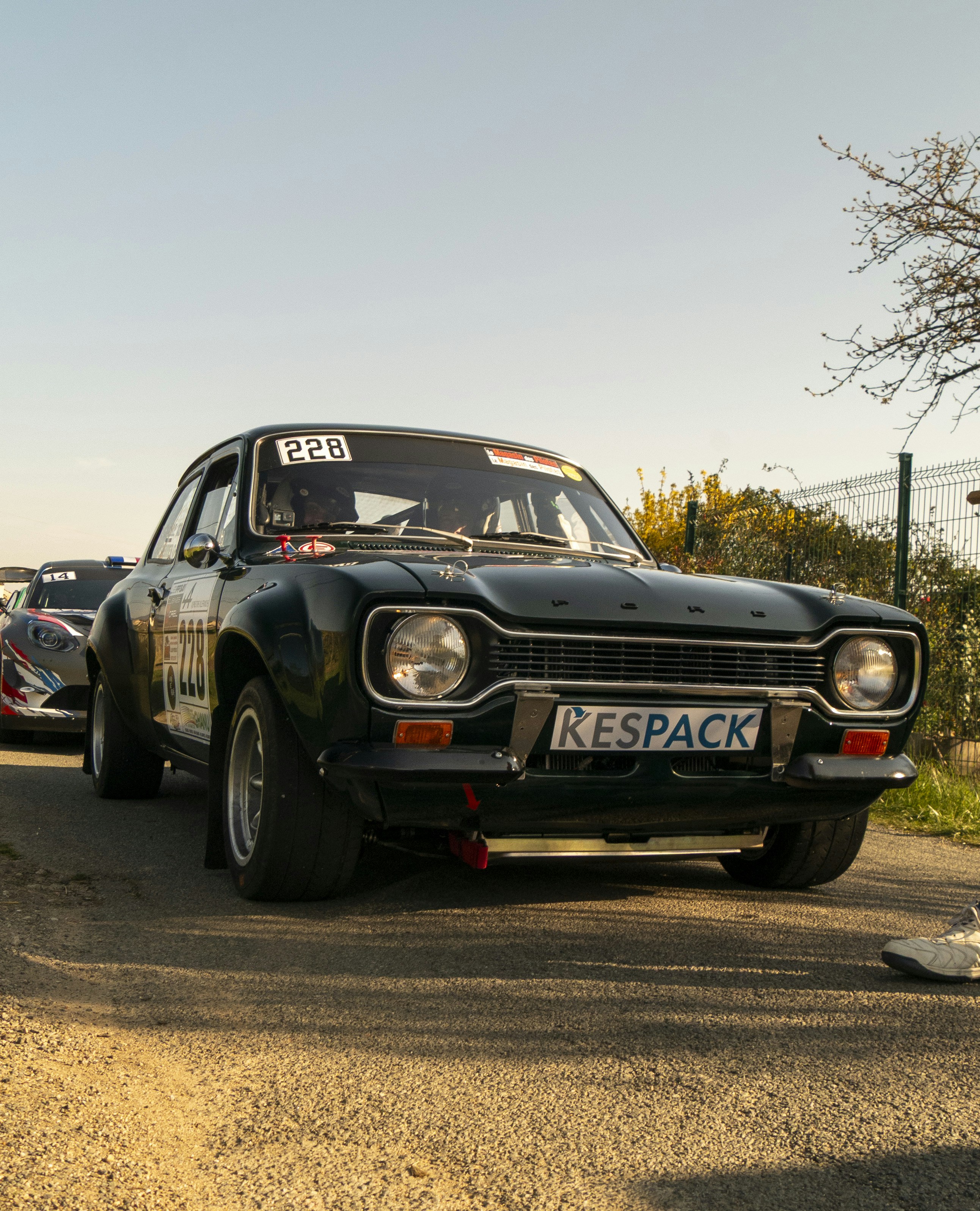 Rally-ready Classic: A black vintage coupe at speed-ready start