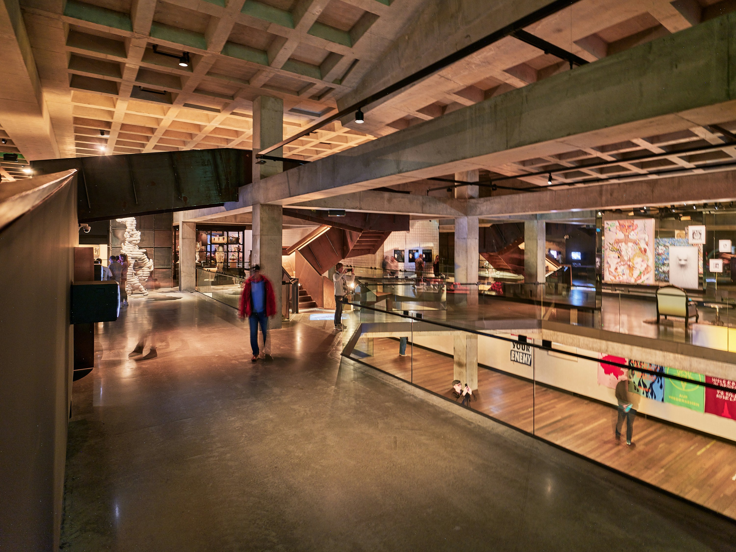Urban Atrium in Motion: Subtle Echoes of Footsteps Beneath Concrete Beams