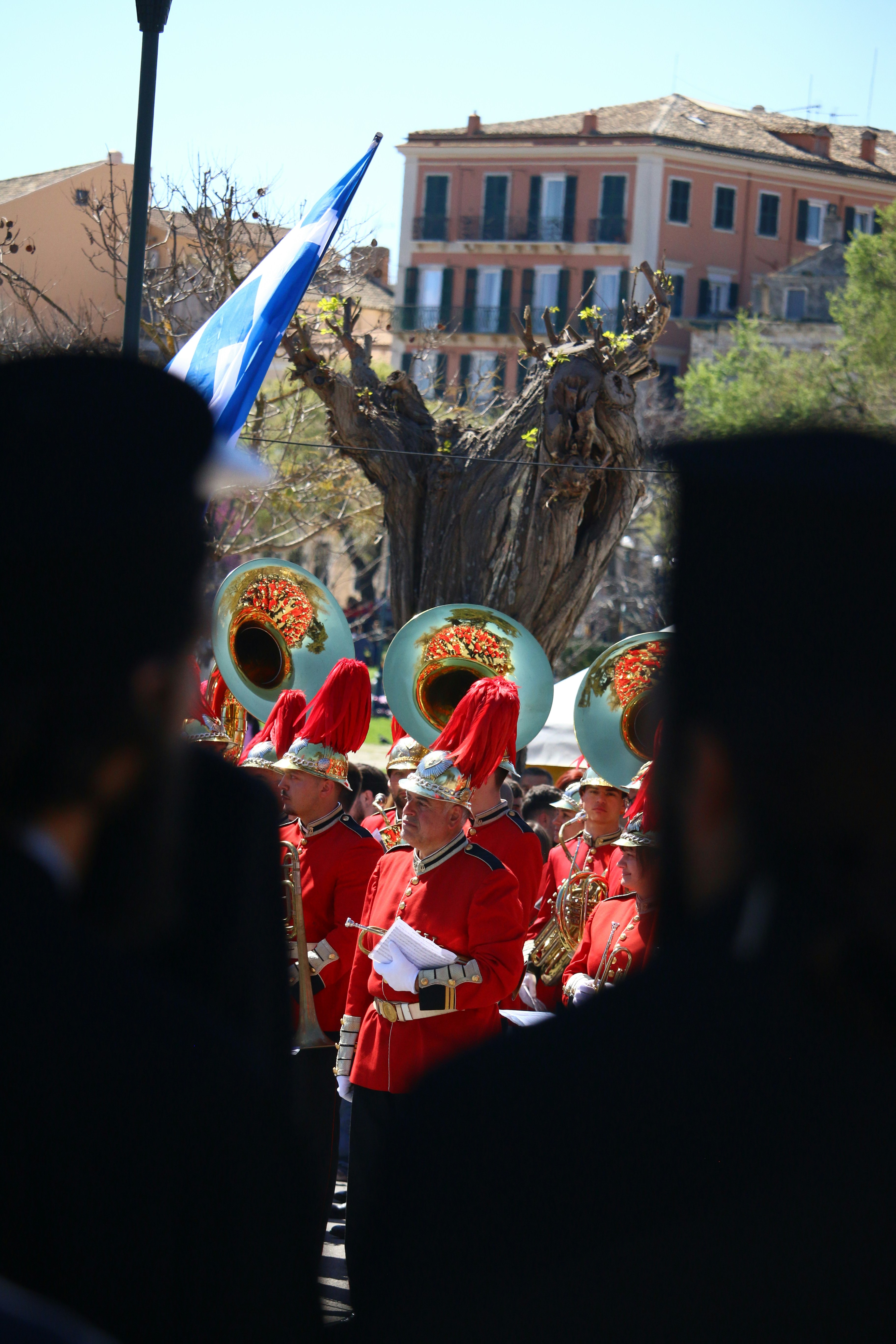 Brass Parade Through Shaded Corners
